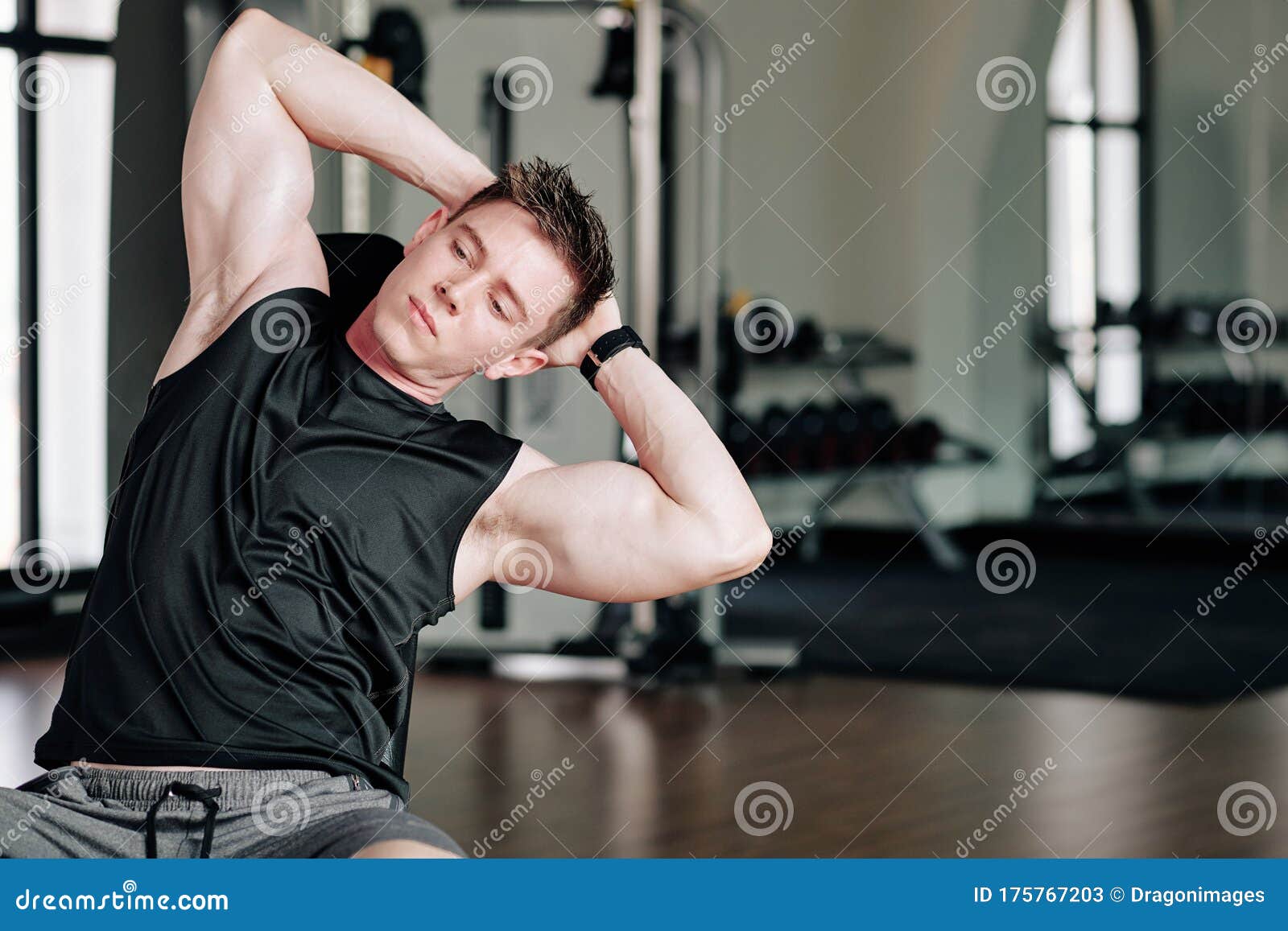 Man doing side bends stock image. Image of males, power - 175767203