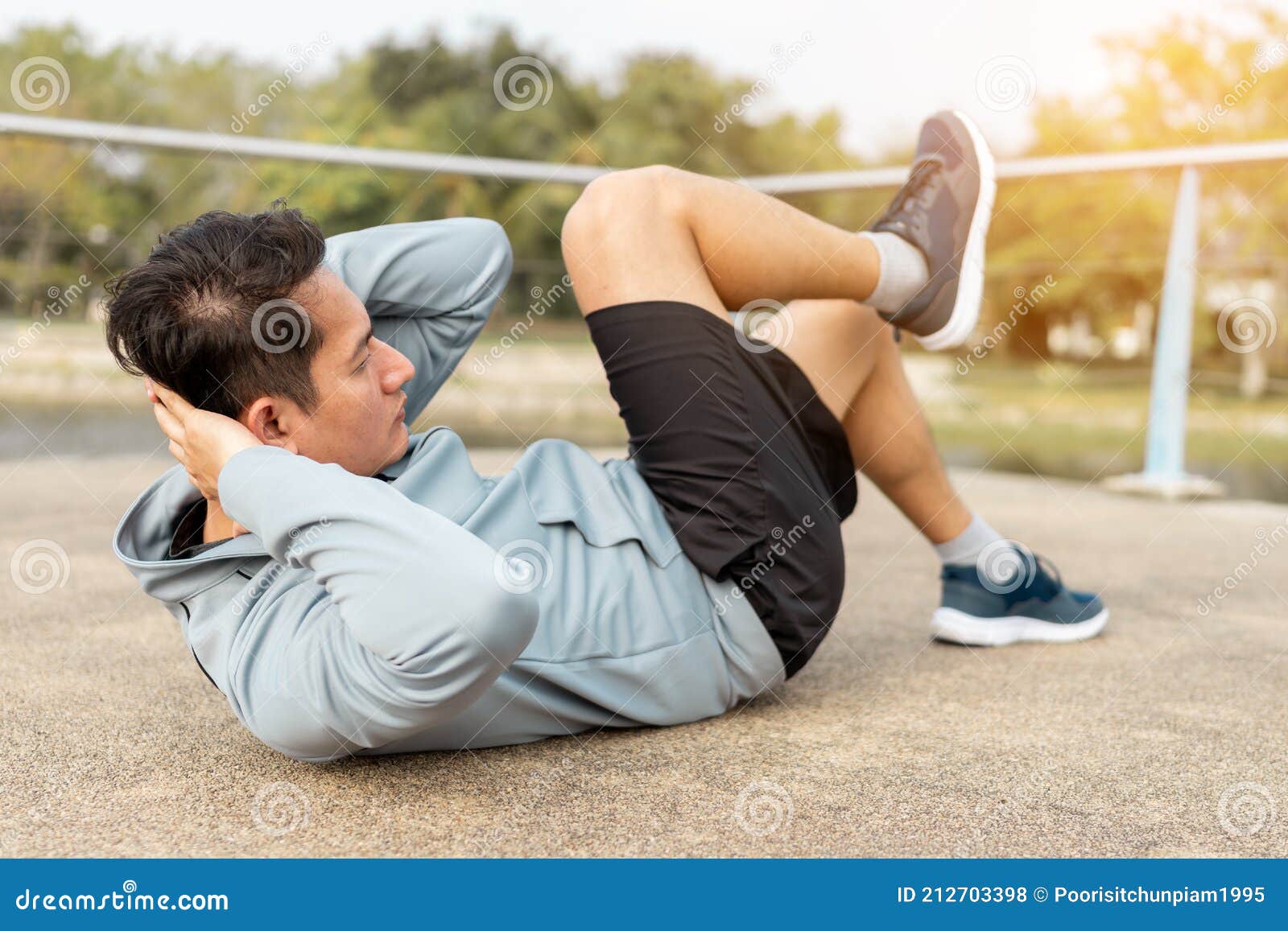 Man Doing Sit Up Exercise Workout Outdoors Stock Photo - Image of ...