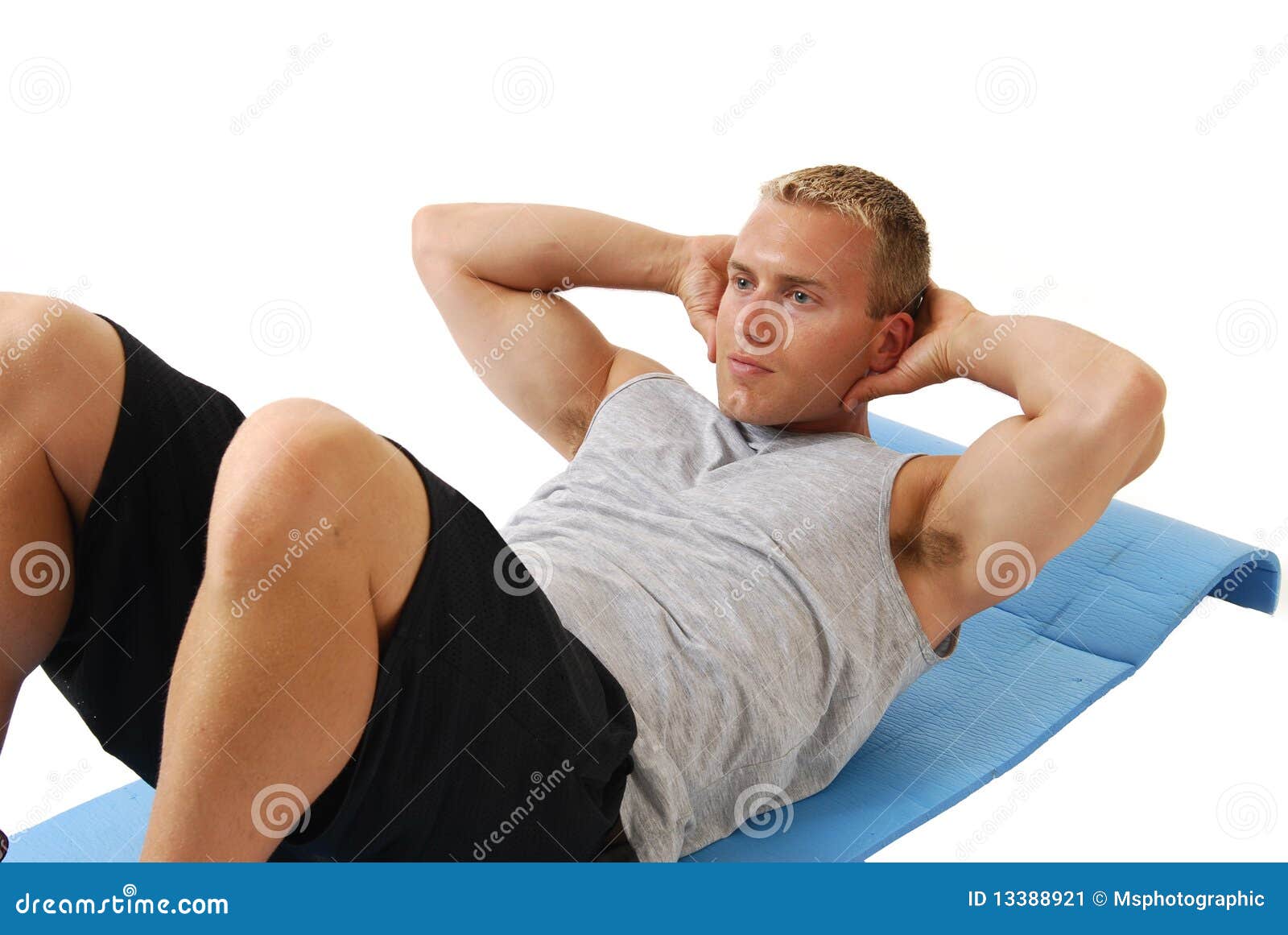 Man doing sit ups stock image. Image of handsome, club - 13388921