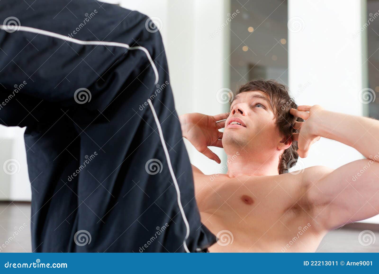 Man doing sit ups in gym stock image. Image of powerful - 22213011