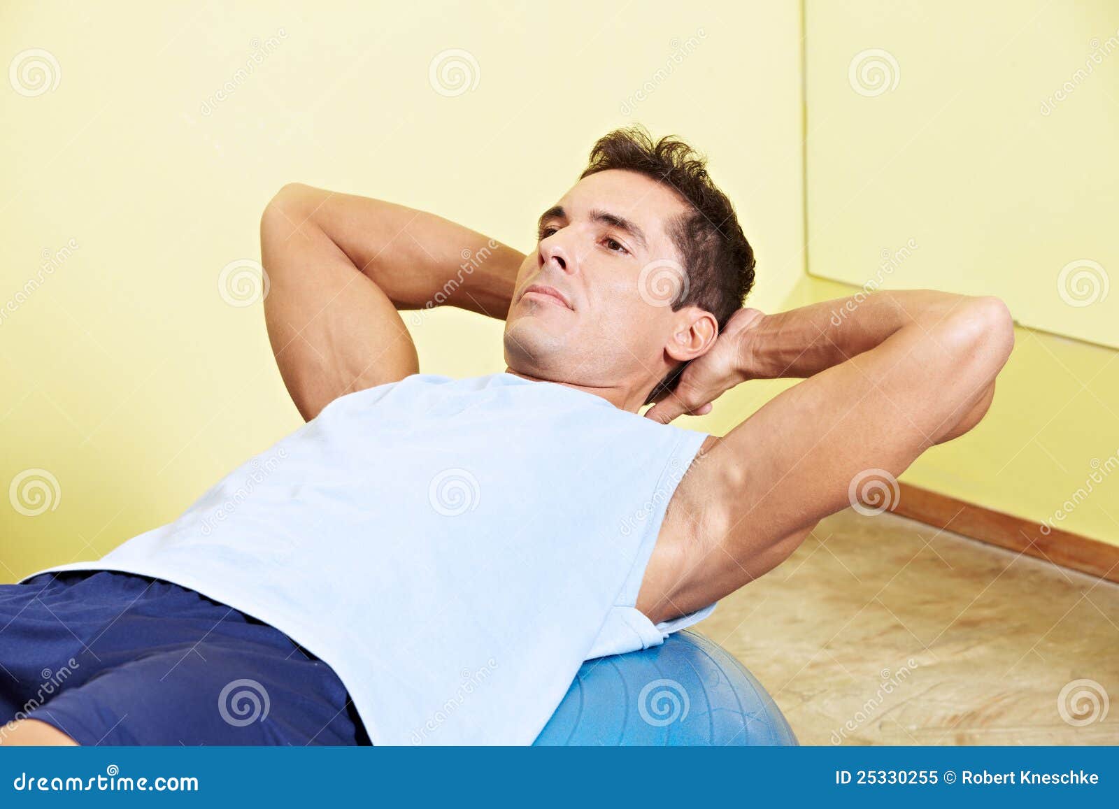 Man doing sit-ups in gym stock image. Image of muscle - 25330255
