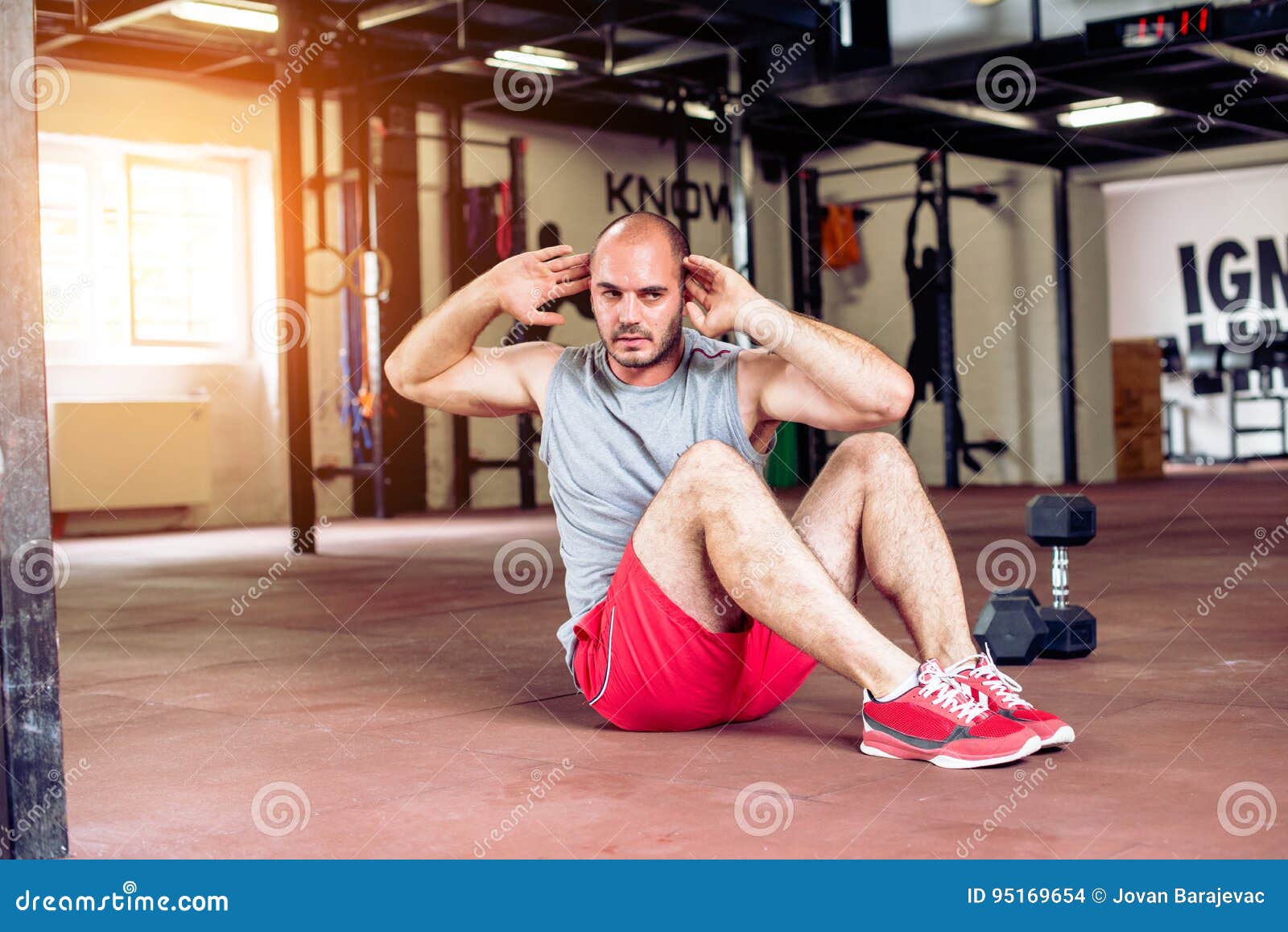 Man doing sit-ups stock photo. Image of indoors, athlete - 95169654