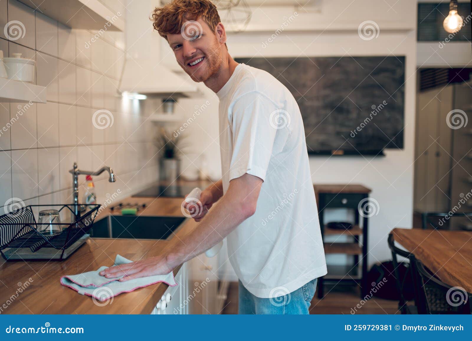 Man Doing Some Housework and Cleaning Some Surfaces Stock Image - Image ...