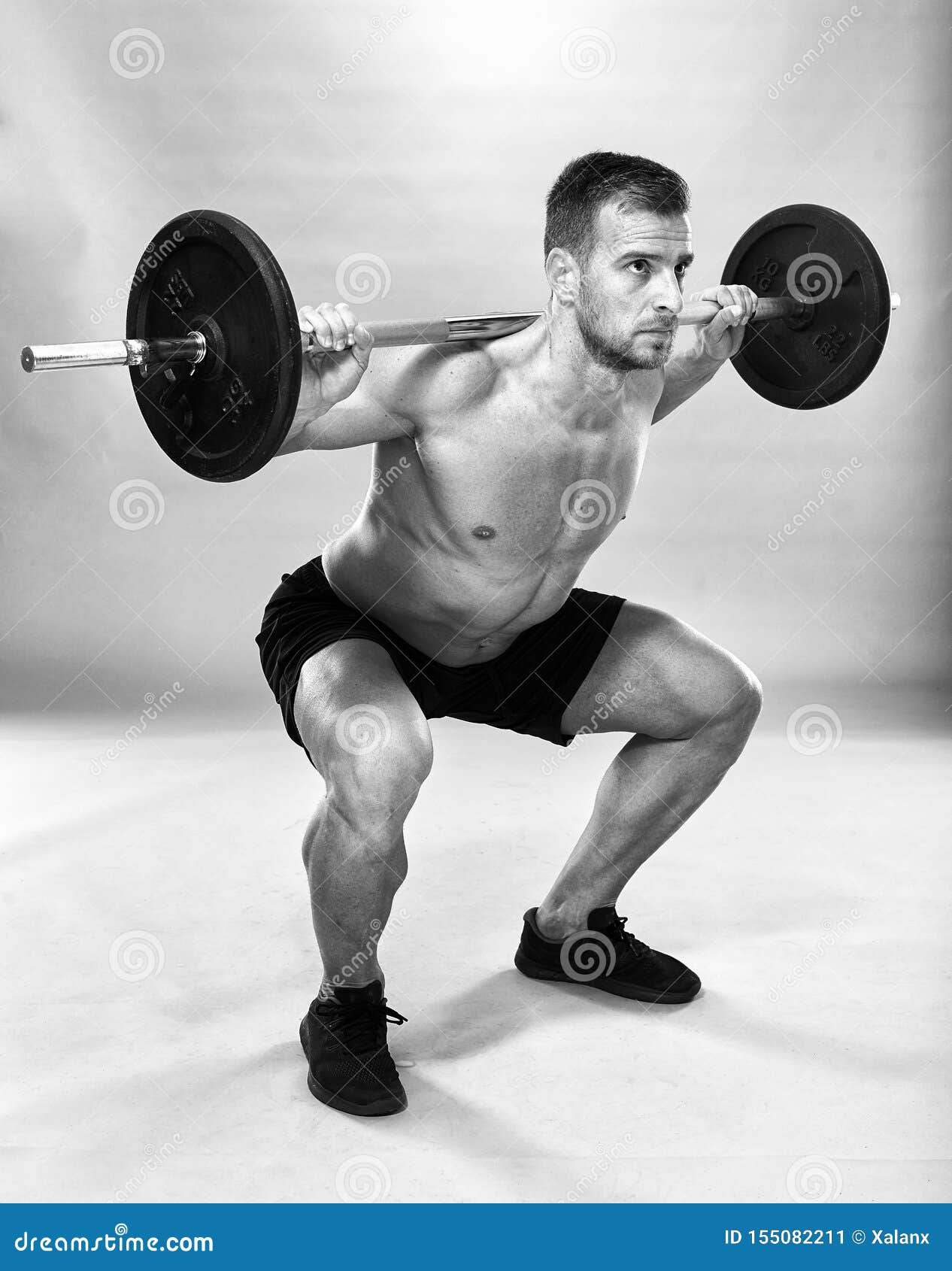 Man Doing Squats with Barbell Stock Image - Image of exercise, legs ...