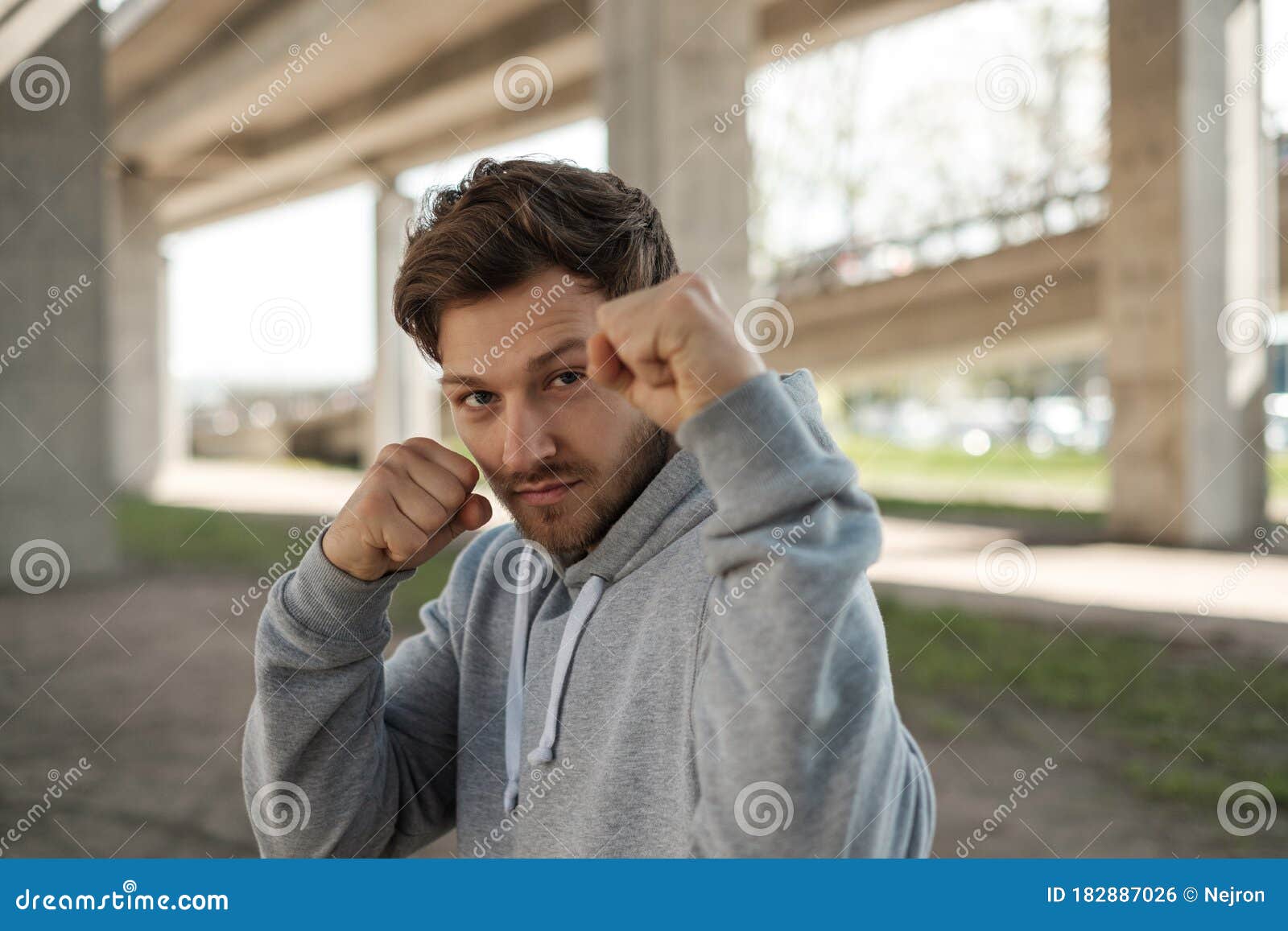 Man Doing Street Workout Alone in a City Stock Photo - Image of ...