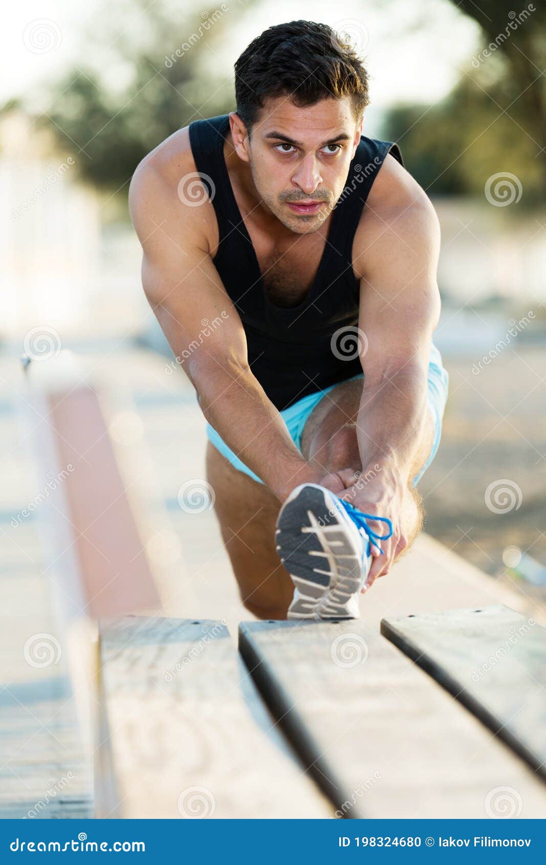 Man Doing Stretching Exercises Stock Photo - Image of adult, male ...