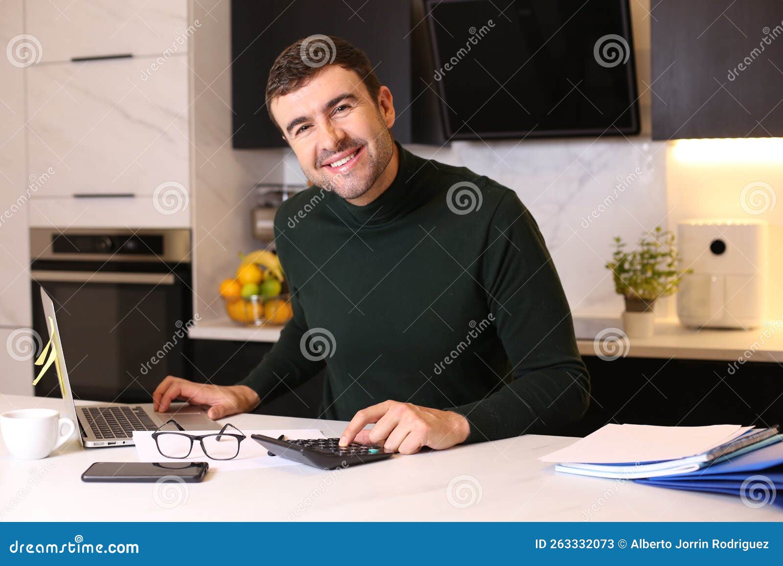 Man doing taxes at home stock image. Image of check - 263332073