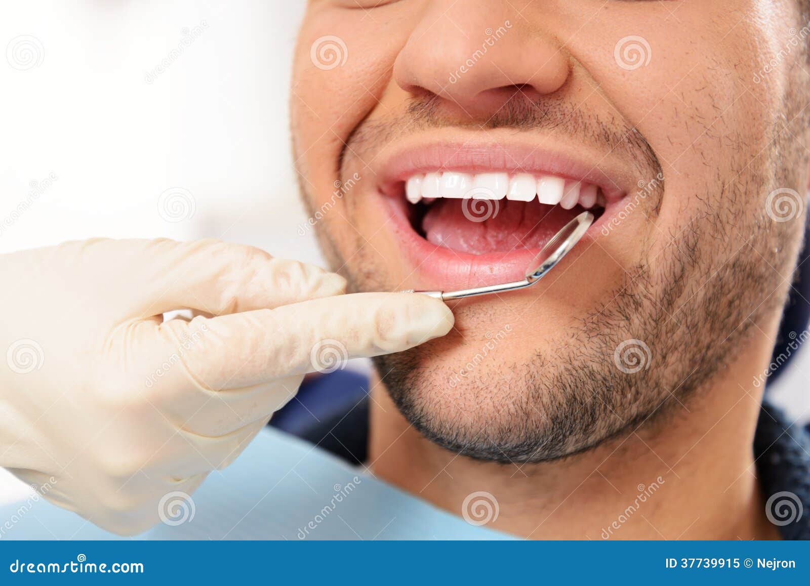 Man doing teeth checkup stock image. Image of procedure - 37739915