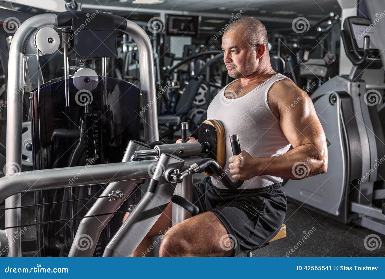 Man Doing Workout with Pull-down Machine Stock Image - Image of ...