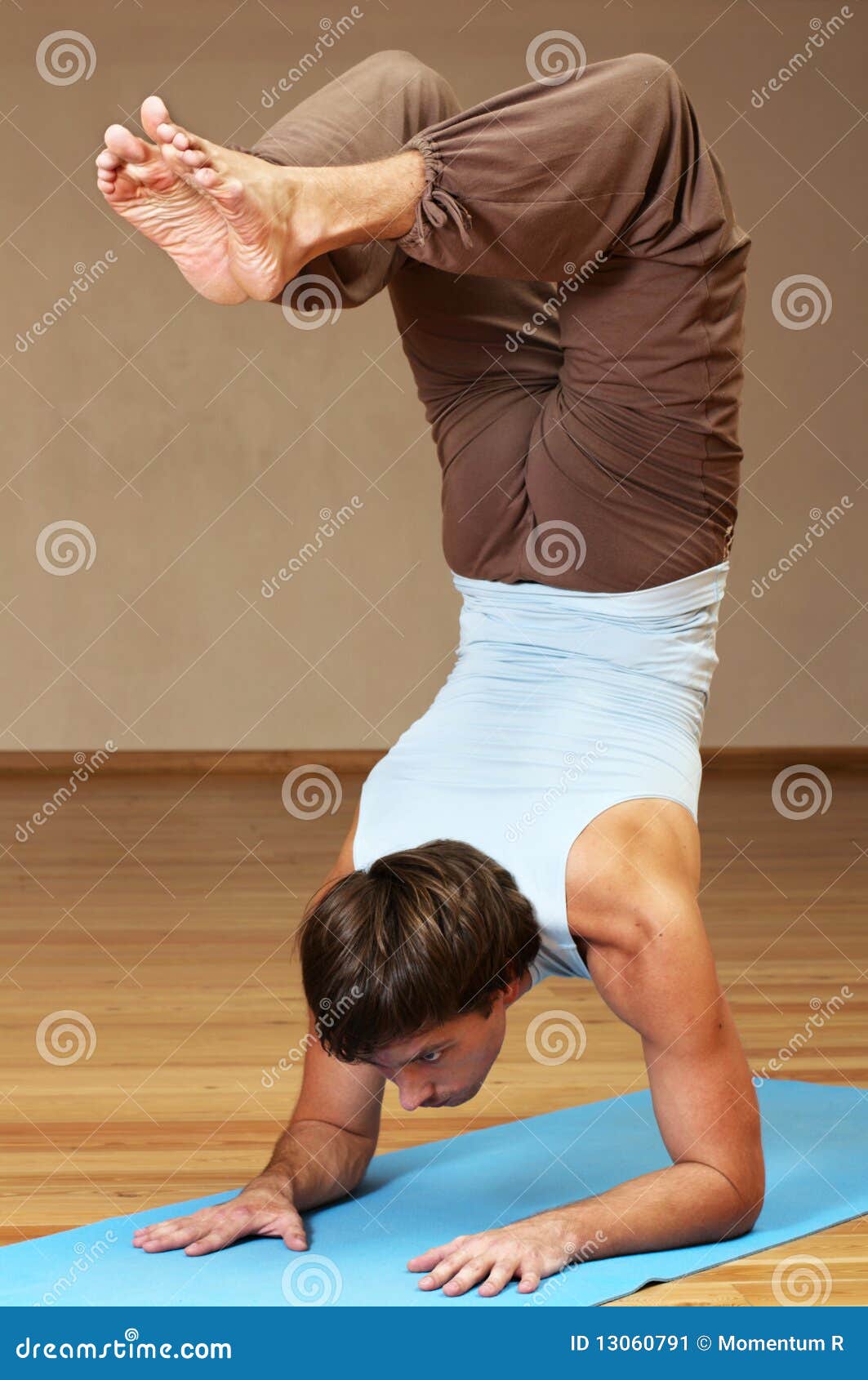 Man doing yoga stock image. Image of indoor, moving, caucasian - 13060791