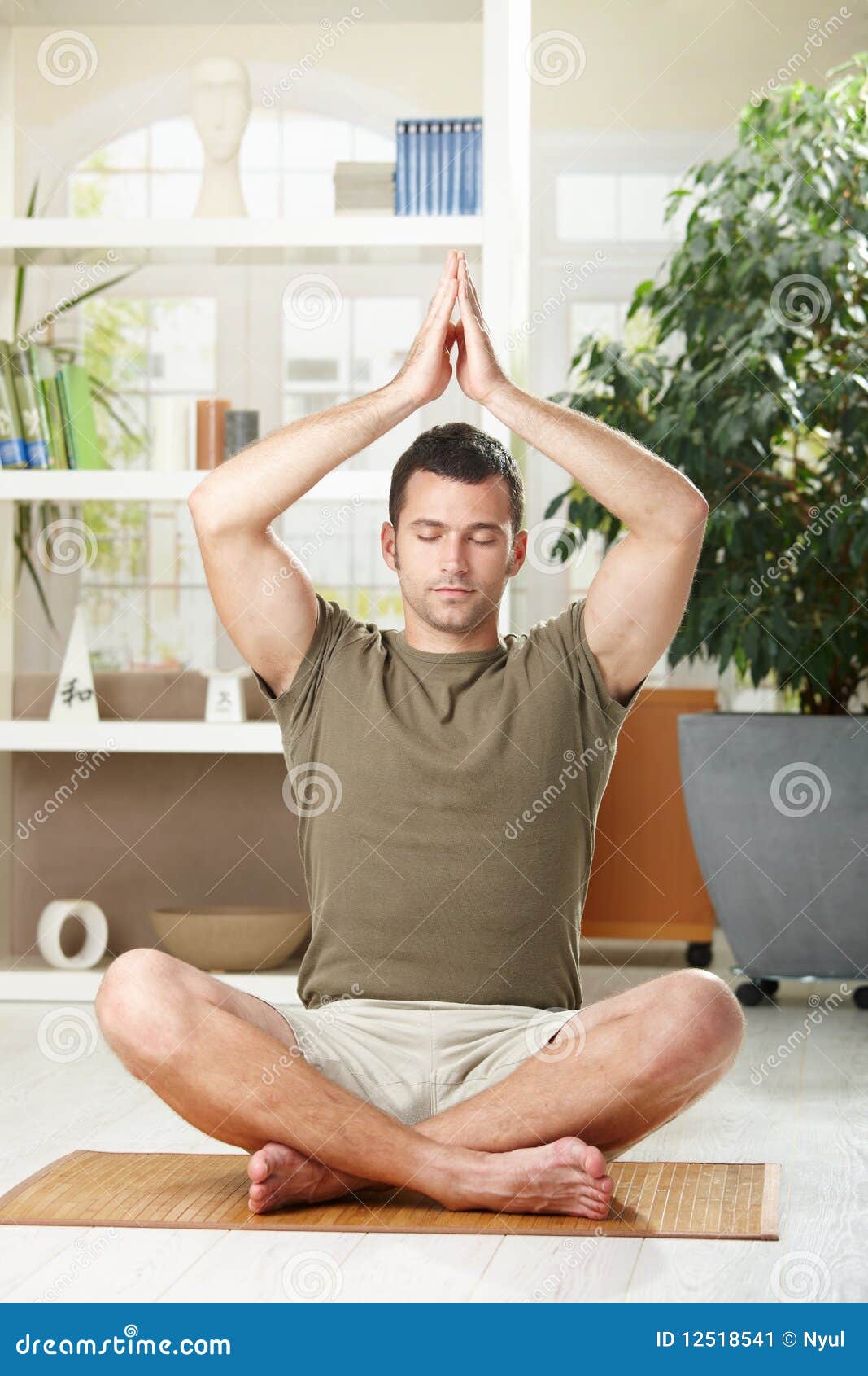 Man doing yoga exercise stock image. Image of american - 12518541