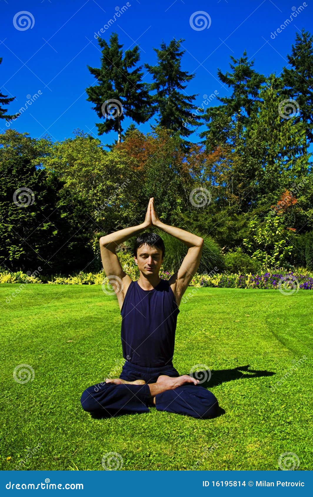 Man doing yoga in nature. stock photo. Image of contemplation - 16195814