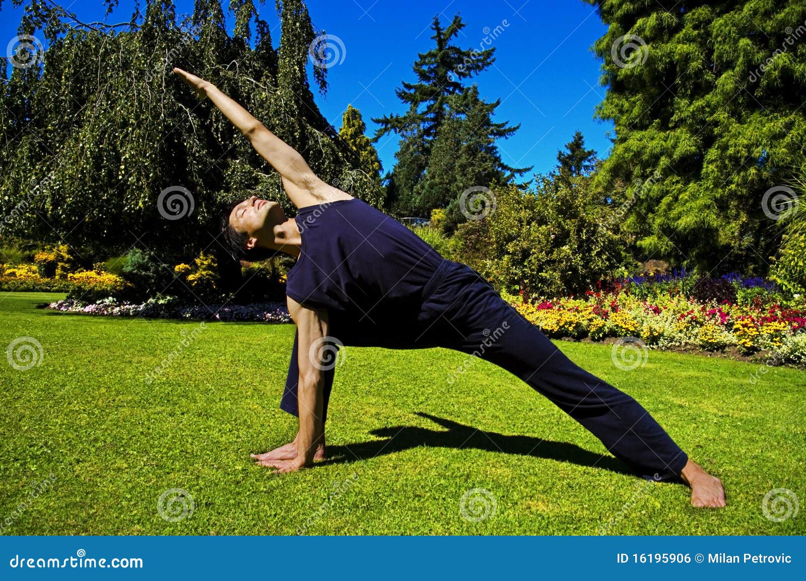 Man doing yoga in nature. stock photo. Image of nature - 16195906