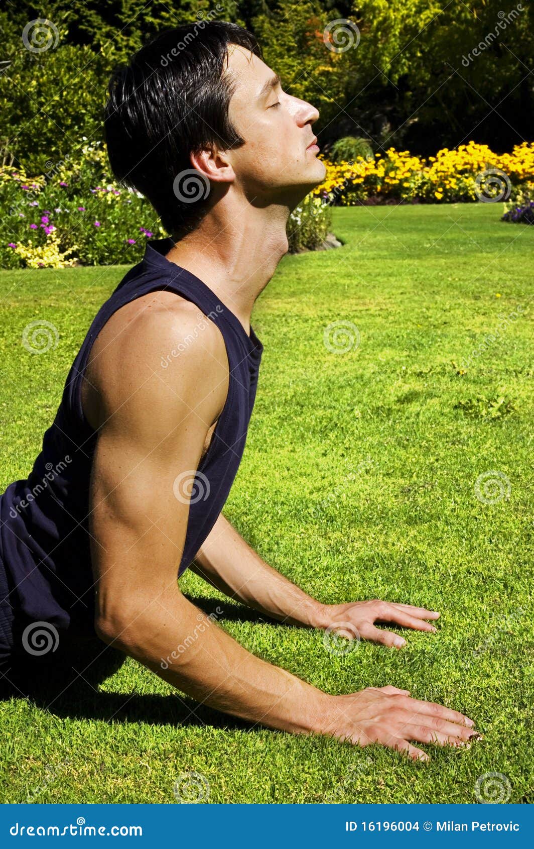 Man doing yoga in nature. stock photo. Image of grass - 16196004