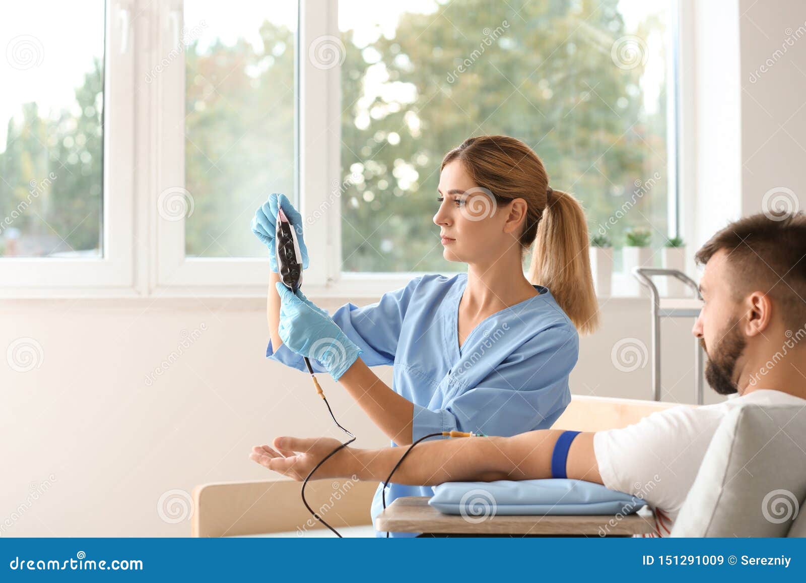 Man Donating Blood in Hospital Stock Image - Image of caucasian, couch ...