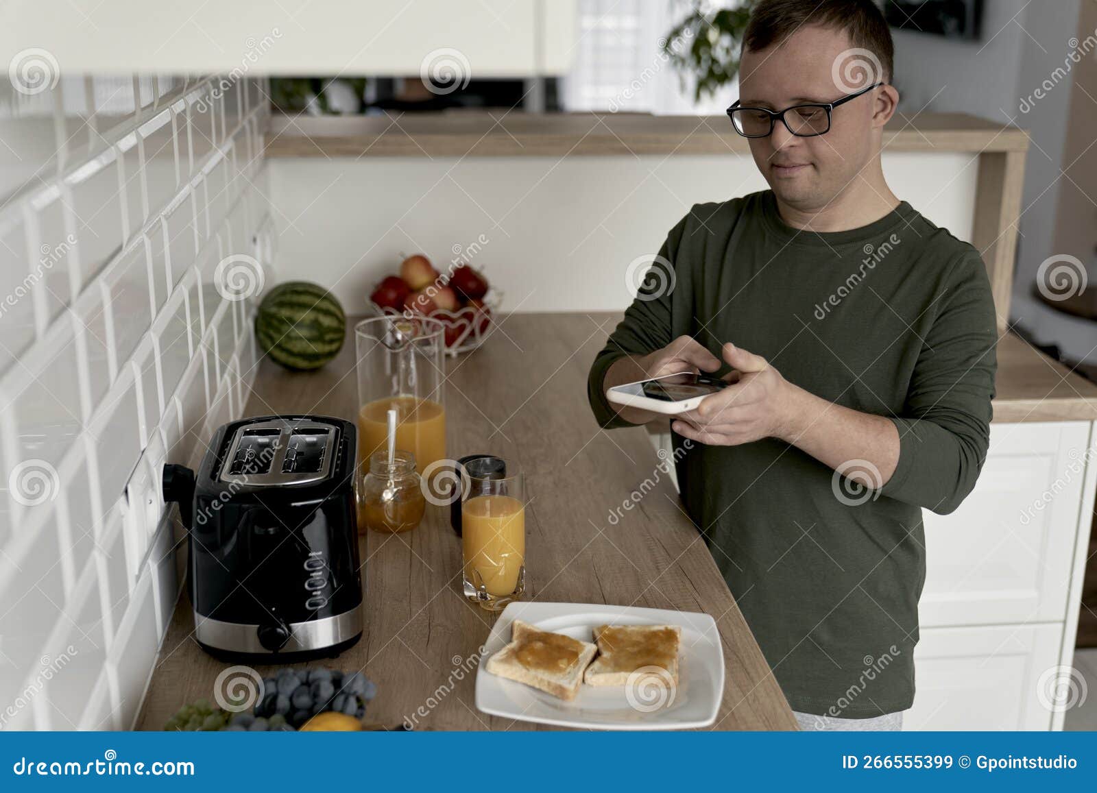 Man with Down Syndrome Preparing Breakfast in Home Stock Image - Image ...