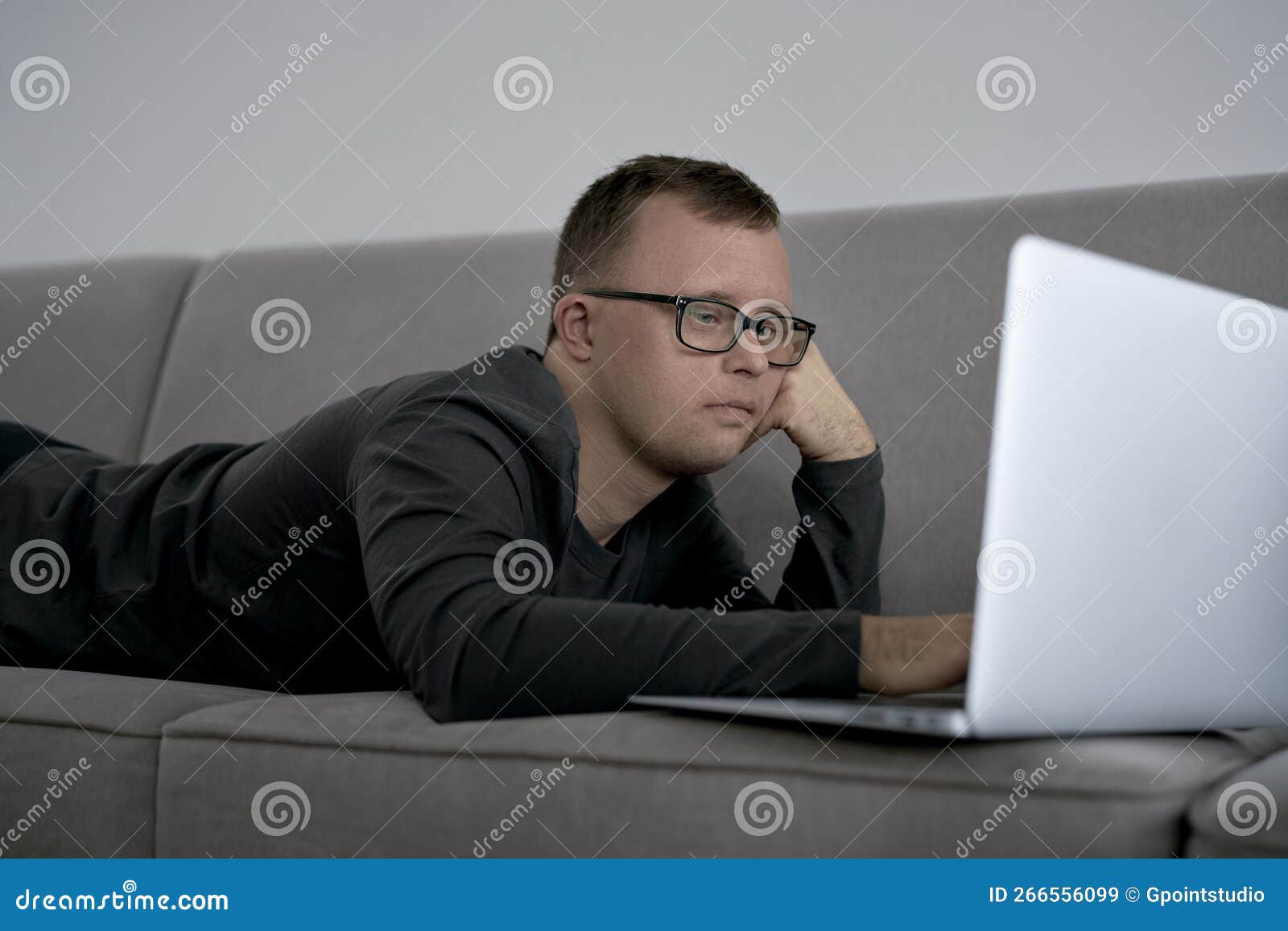 Man with Down Syndrome Using Laptop at Home Stock Image - Image of ...