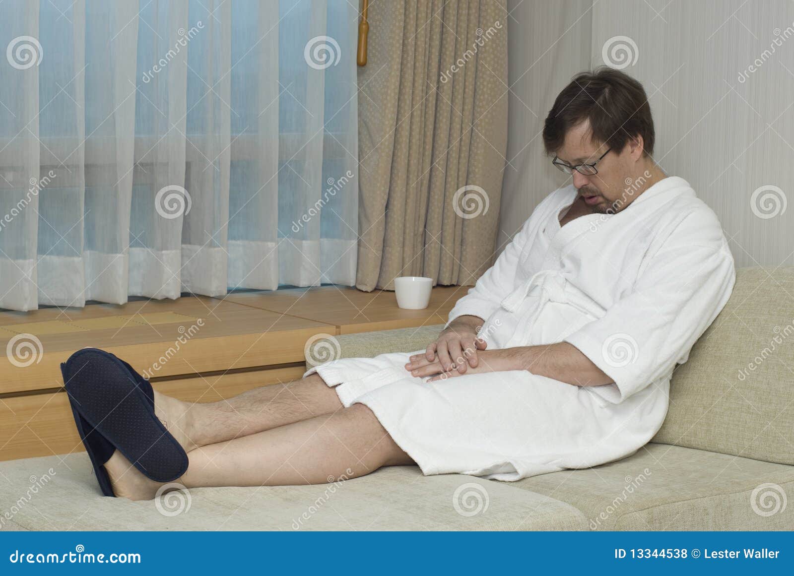 Man dozing on couch stock photo. Image of sleep, coffee - 13344538