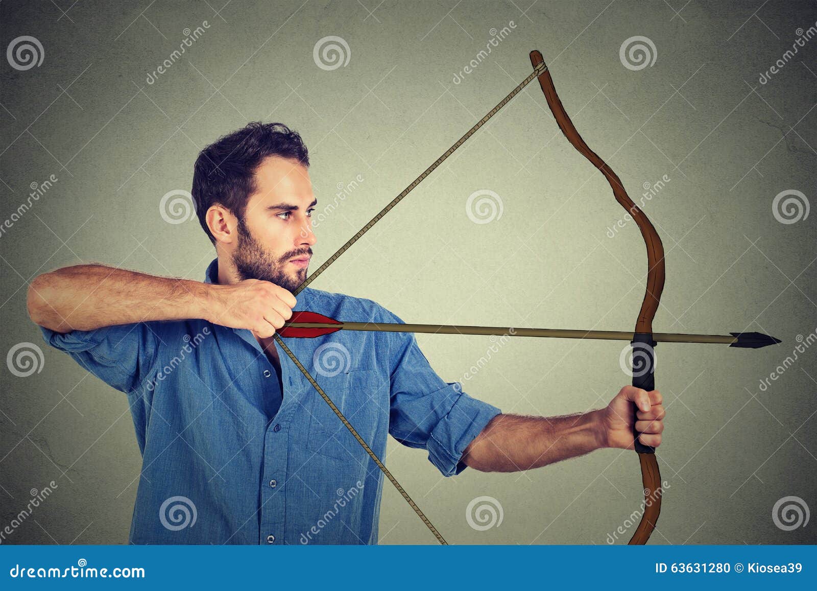 Man drawing a bow stock photo. Image of fire, concentration - 63631280