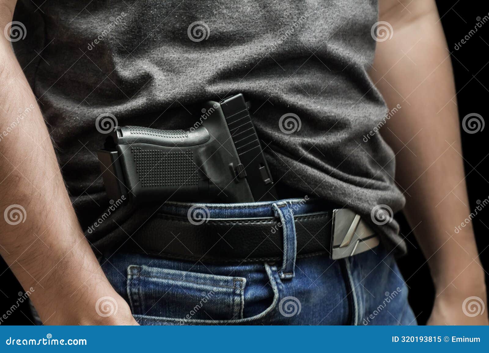 Man Drawing a Conceal Carry Pistol from a Holster Stock Image - Image ...