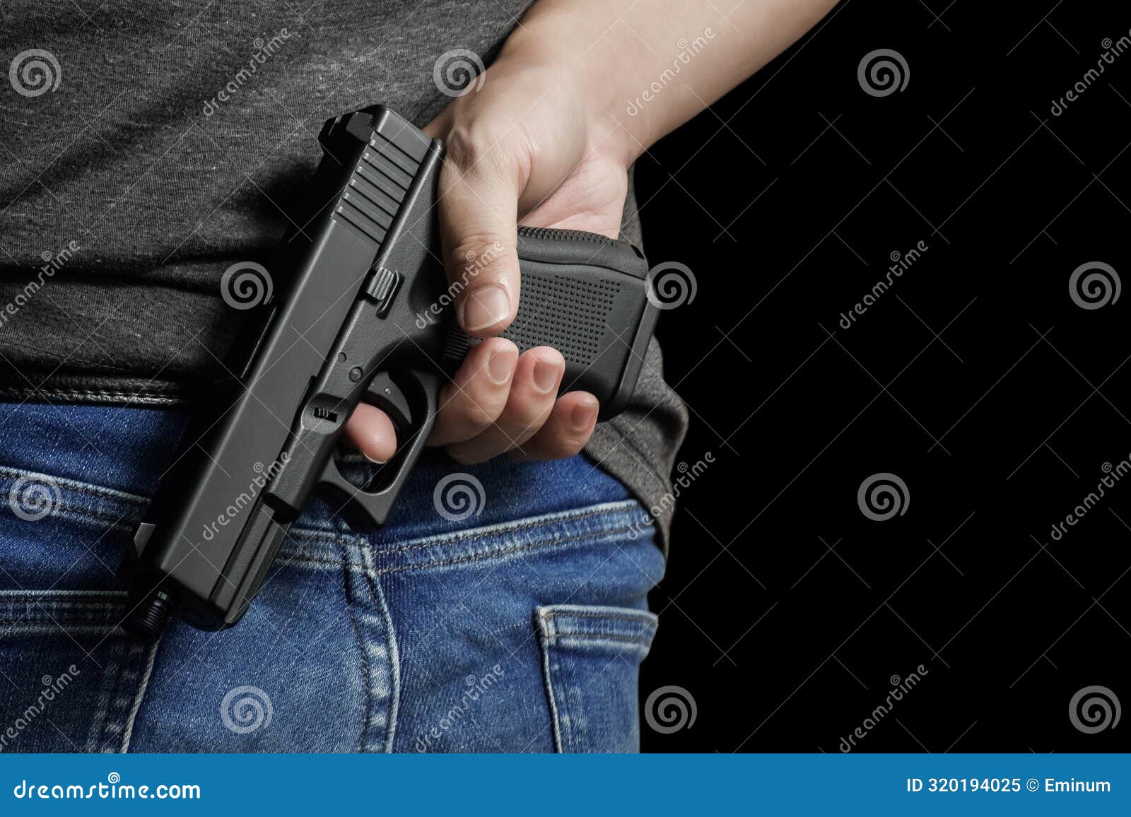 Man Drawing a Conceal Carry Pistol from a Holster Stock Image - Image ...