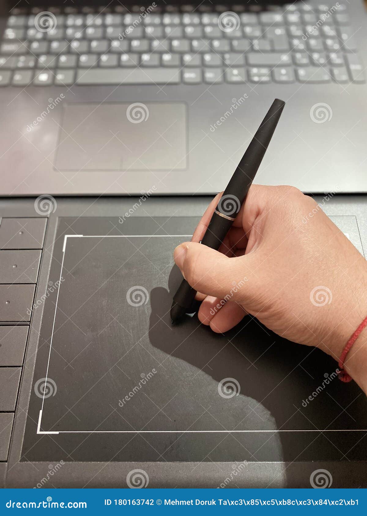 Man Drawing on Graphic Tablet with Electronic Pen in His Hand Stock ...
