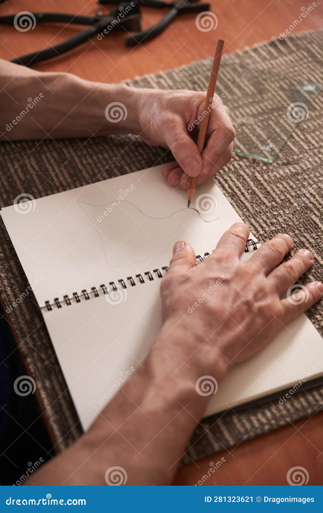 Man Drawing Sketch in Notebook Stock Image - Image of work, material ...