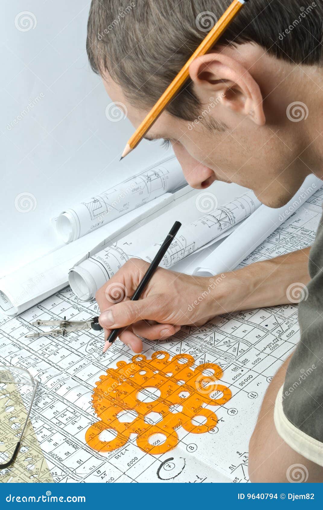 Man and drawings stock photo. Image of creativity, designer - 9640794