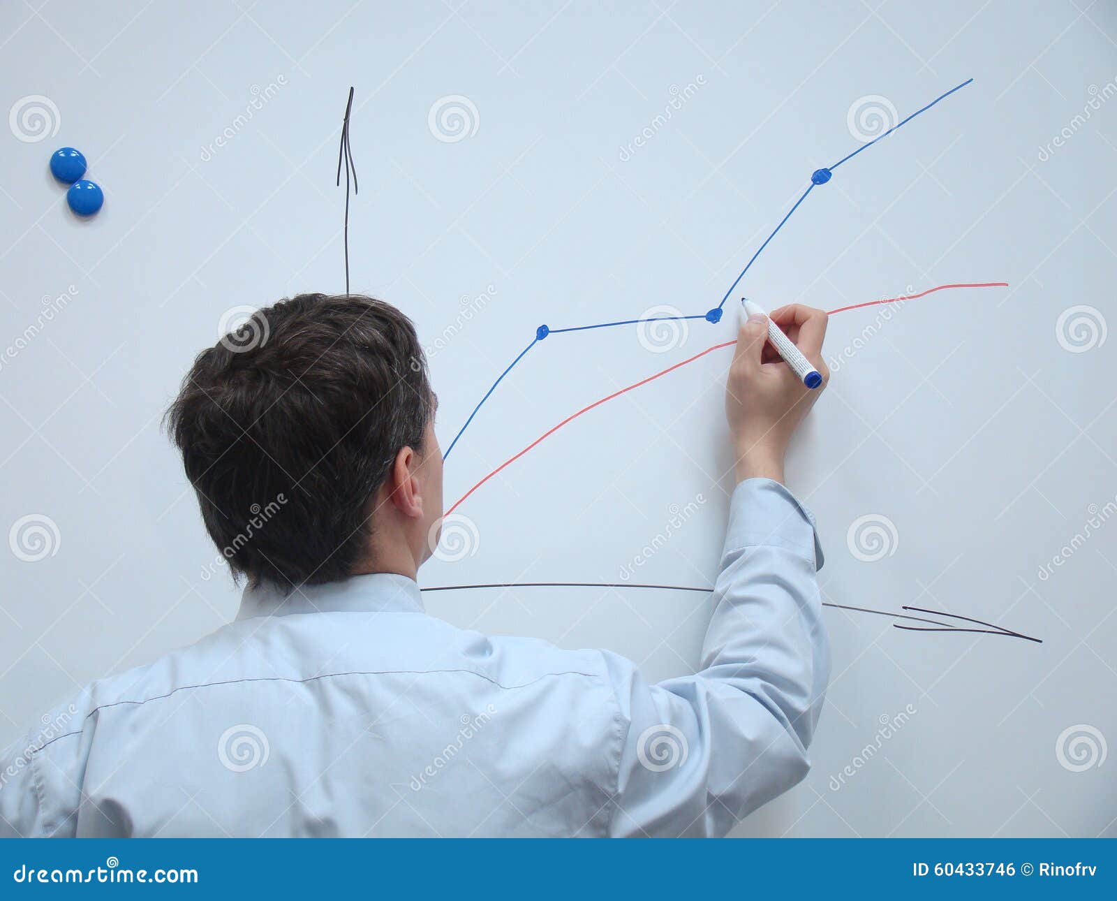 Man Draws a Graph on the Board Stock Photo - Image of company, graph ...