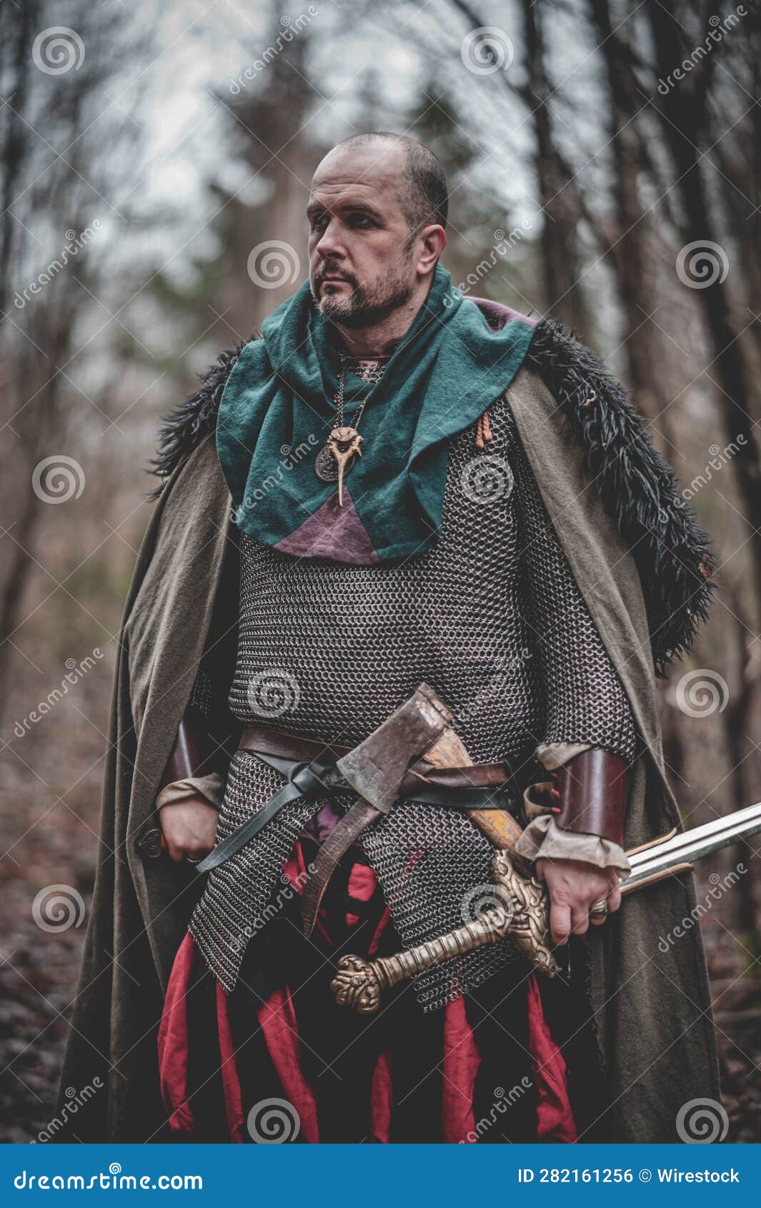 Man Dressed in Authentic Medieval Armor Standing in the Middle of ...
