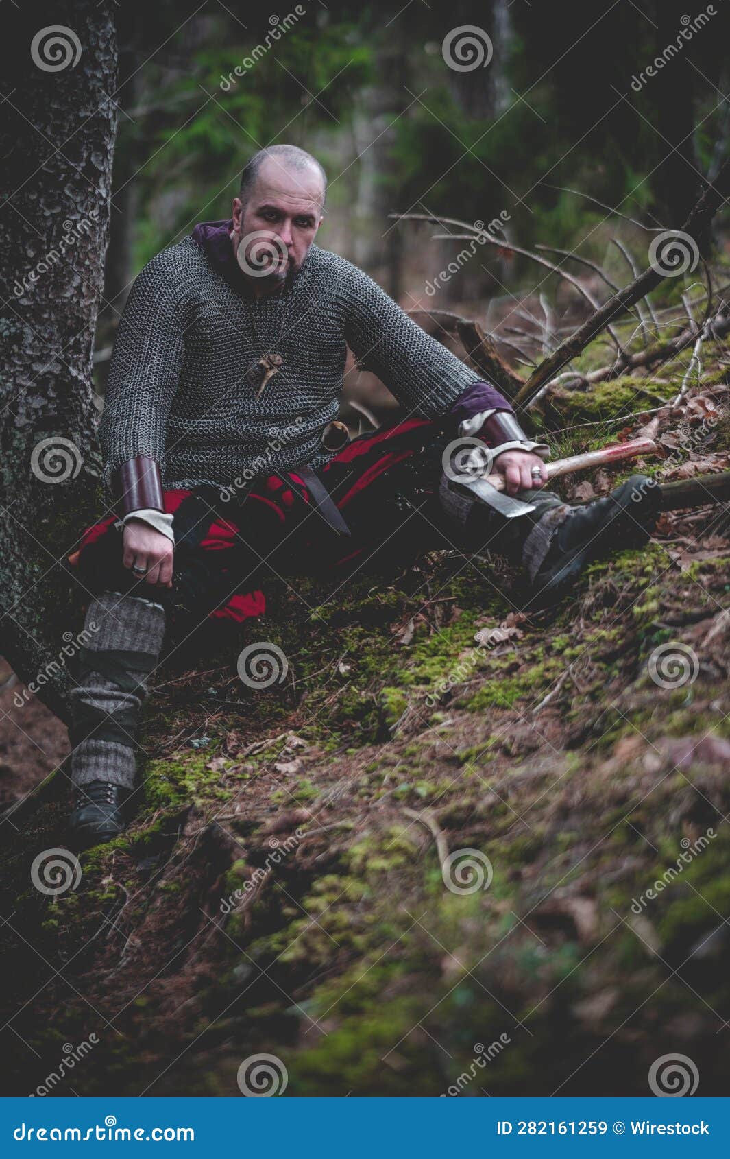 Man Dressed in Authentic Medieval Armor Standing in the Middle of ...