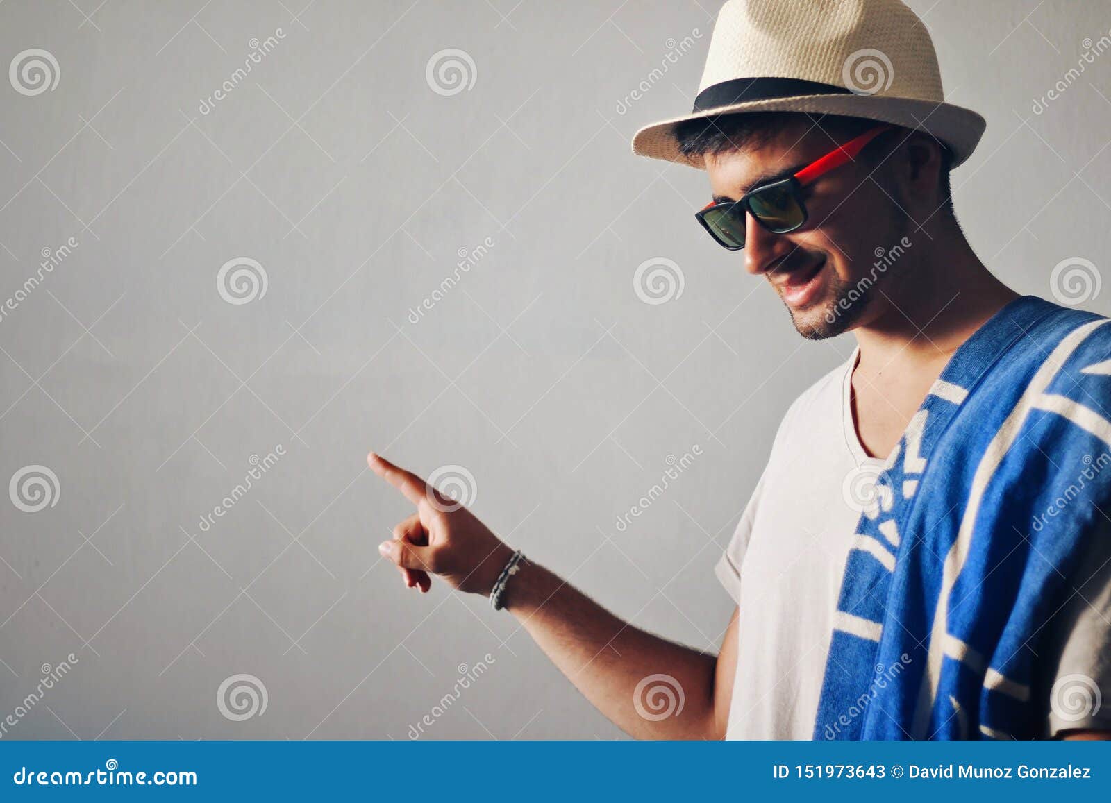 Man with a hat pointing. stock image. Image of modern - 151973643
