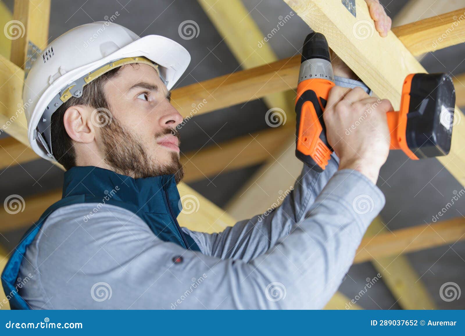 Man Drilling New House Construction Frame Stock Photo - Image of ...