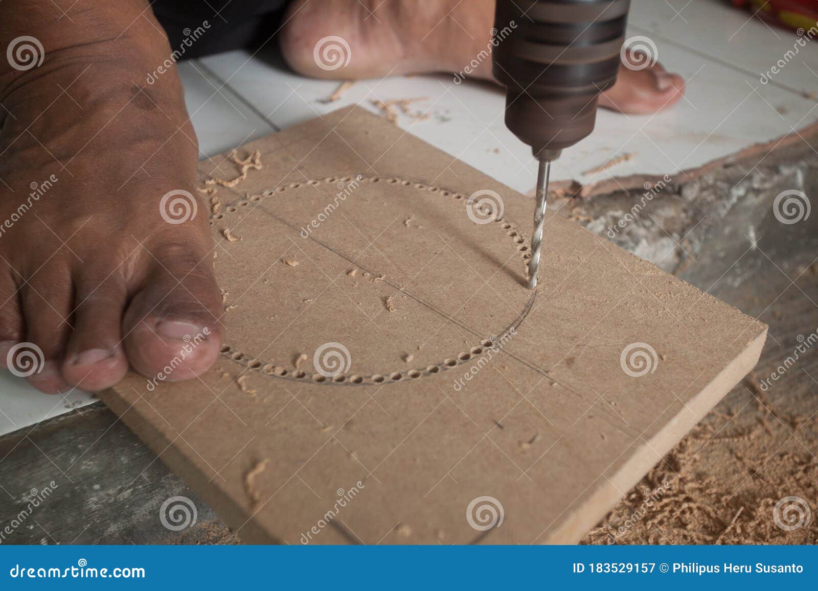 Man Drilling Round Pattern Shape on MDF Board for DIY Project Stock ...