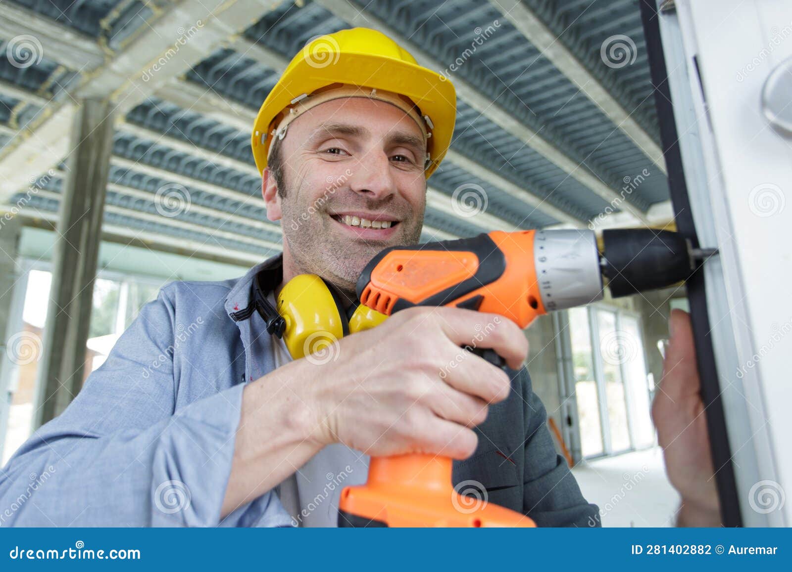 Man drilling window frame stock photo. Image of handyman - 281402882