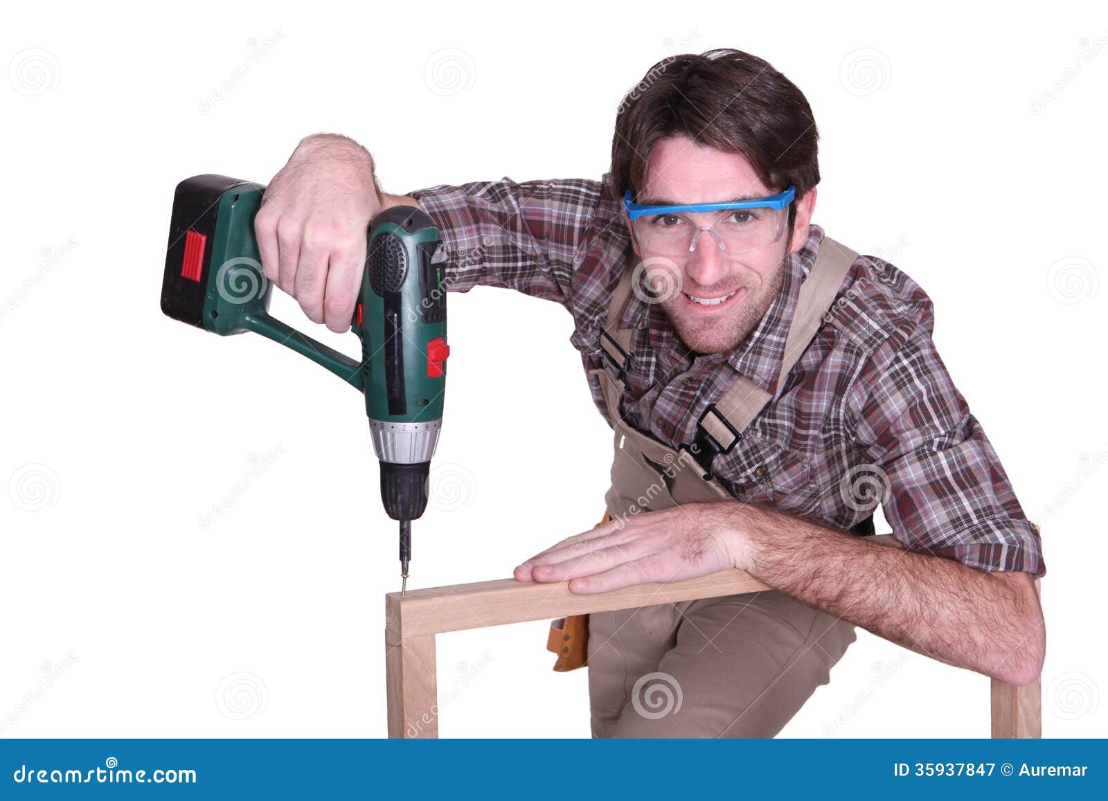 Man Drilling into Wooden Frame Stock Image - Image of home, stud: 35937847