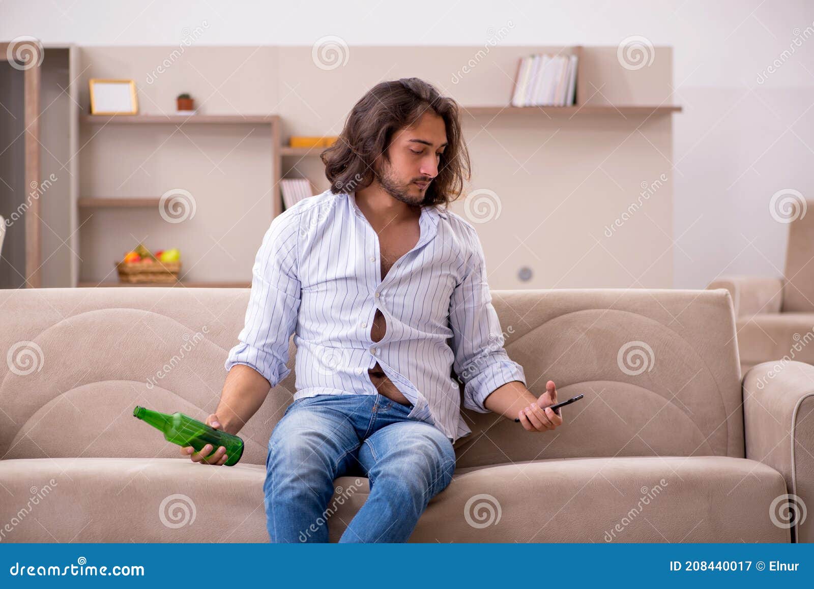 Young Man Drinking Alcohol at Home Stock Image - Image of drinking ...