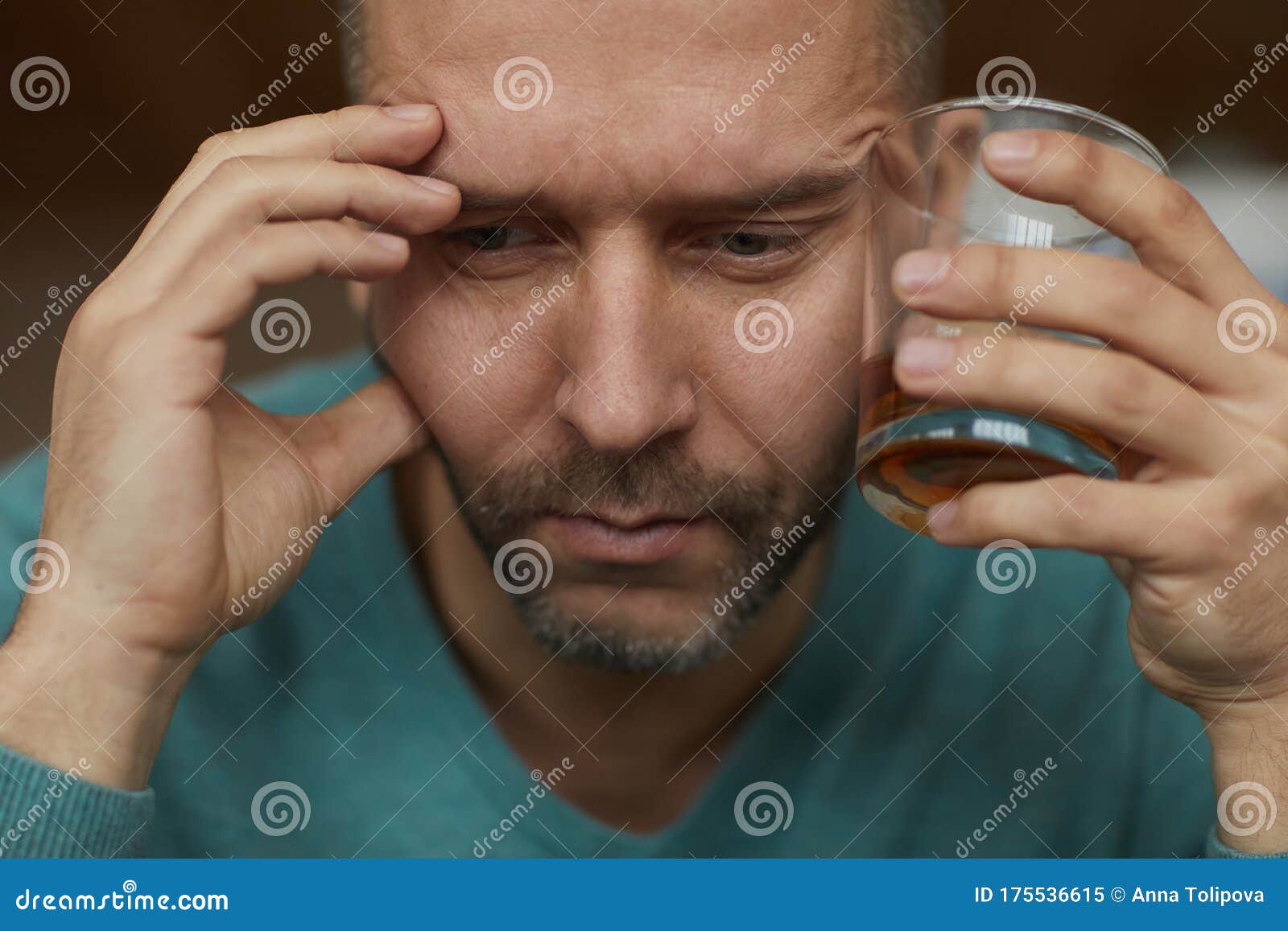 Man drinking alcohol stock image. Image of serious, looking - 175536615