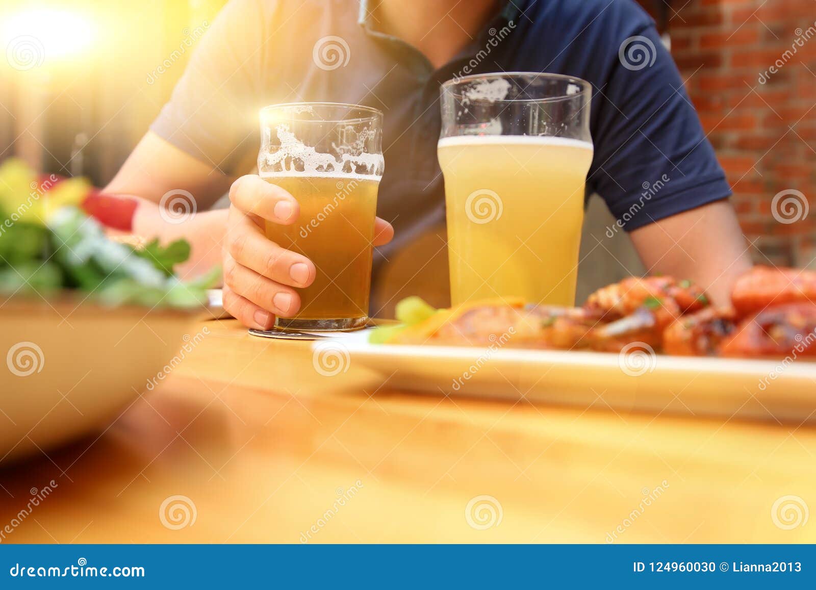 Man Drinking Beer in the Bar. Stock Photo - Image of happy, male: 124960030