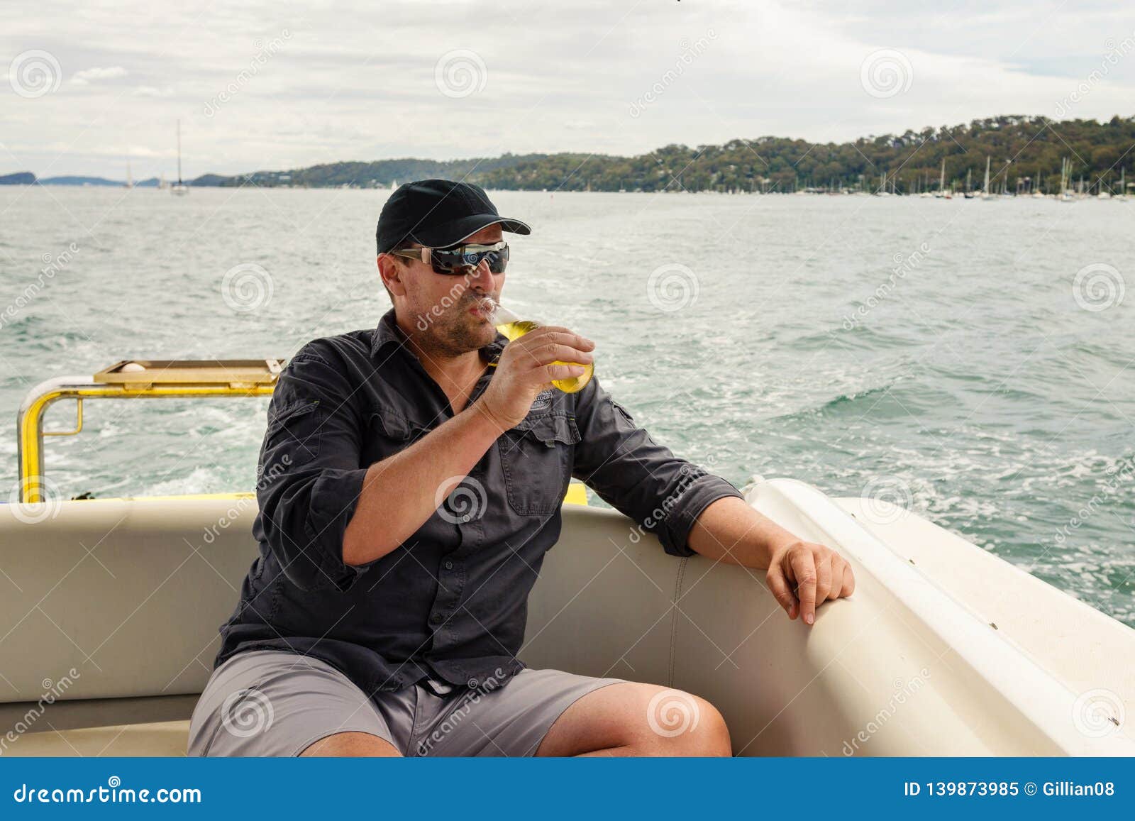 Man Drinking Beer on a Boat Stock Image - Image of sunglasses, boat ...