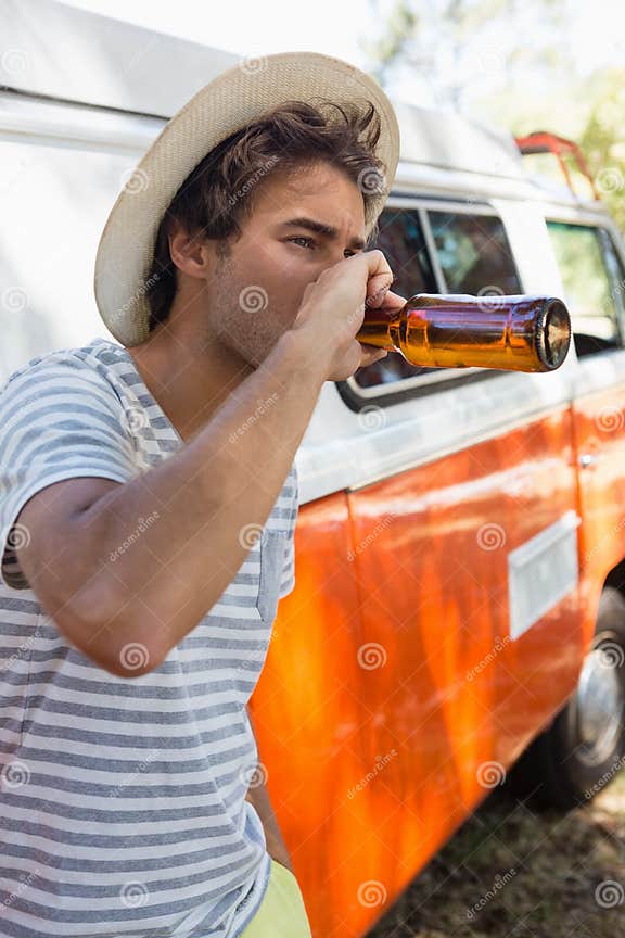 Man Drinking Beer from Bottle in the Park Stock Photo - Image of ...