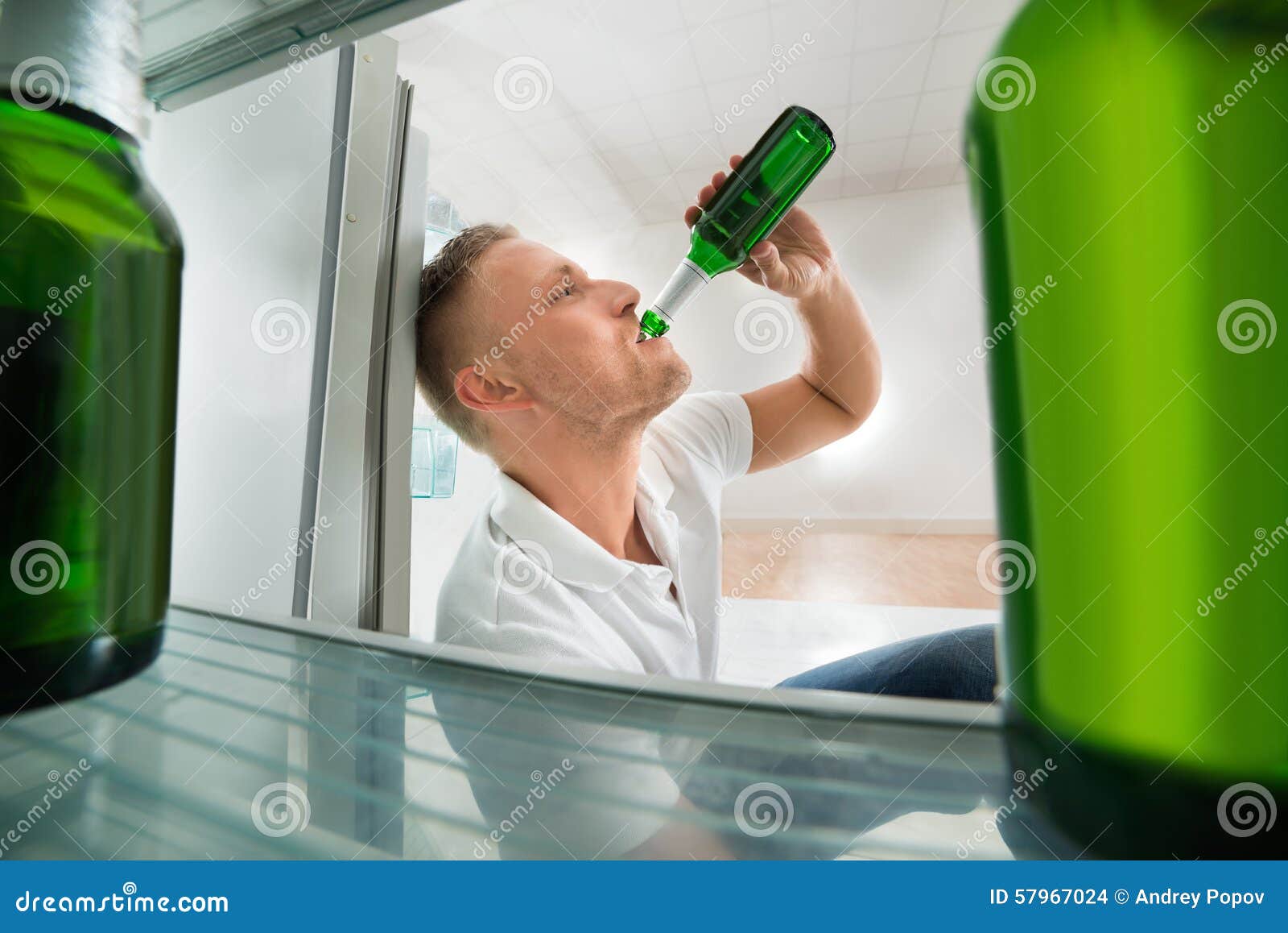 Man Drinking Beer in Front of Open Refrigerator Stock Photo - Image of ...