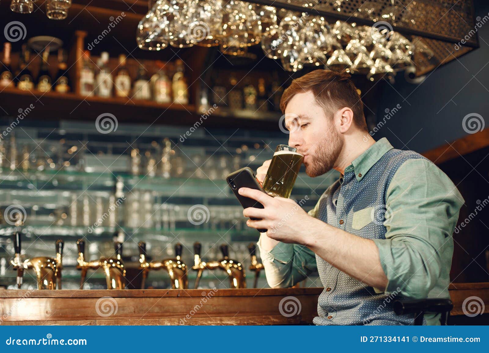 Man with Beer at Bar with a Phone Stock Image - Image of english ...