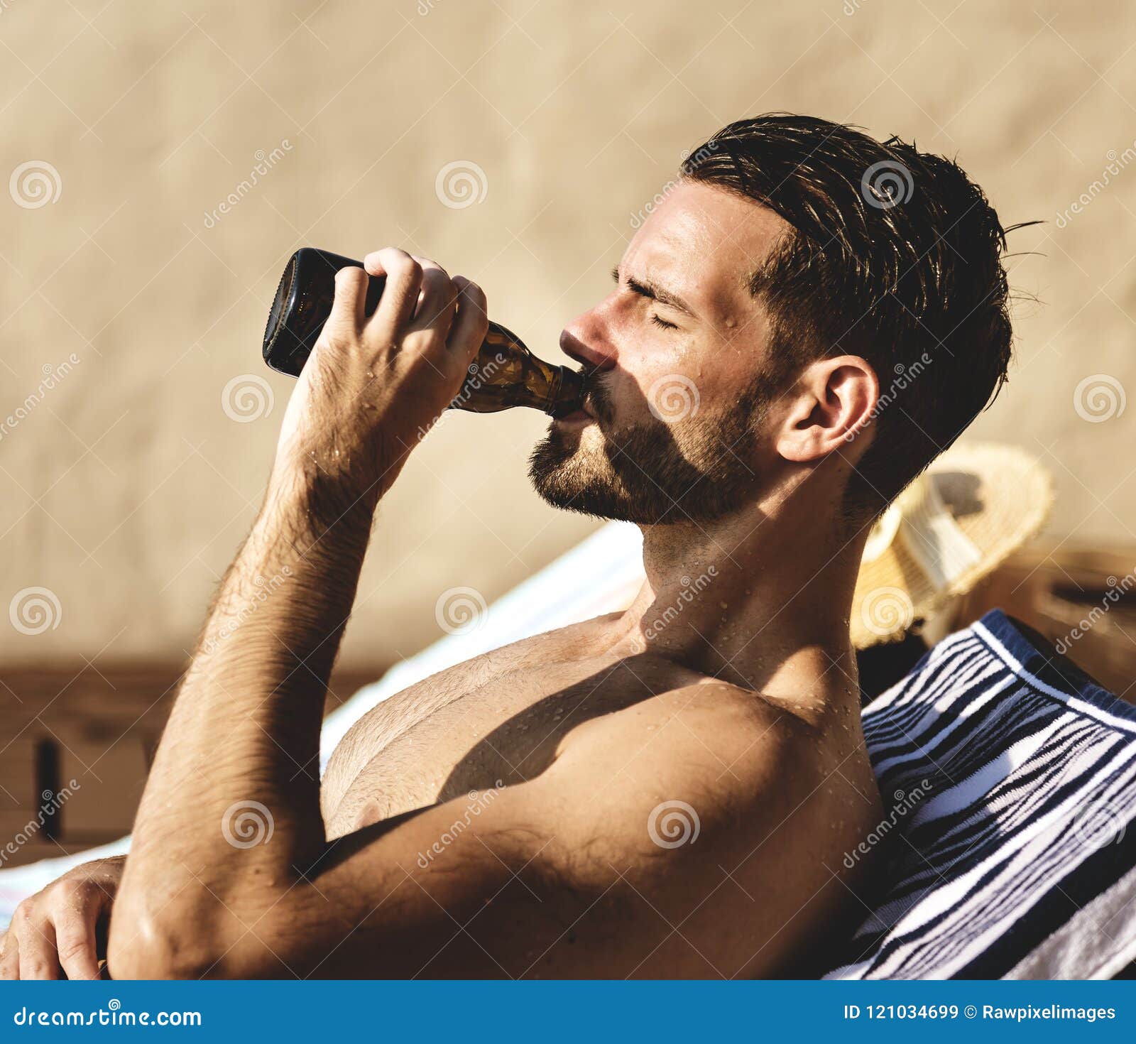 Man Drinking a Beer by the Pool Stock Image - Image of holiday, lager ...