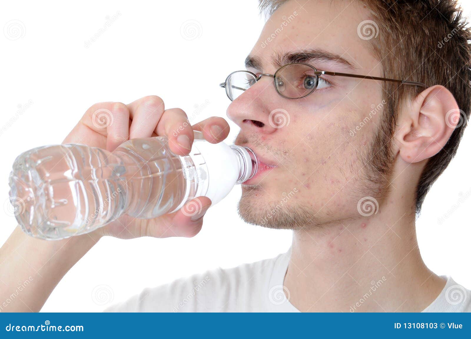 Man drinking bottled water stock image. Image of teenager - 13108103