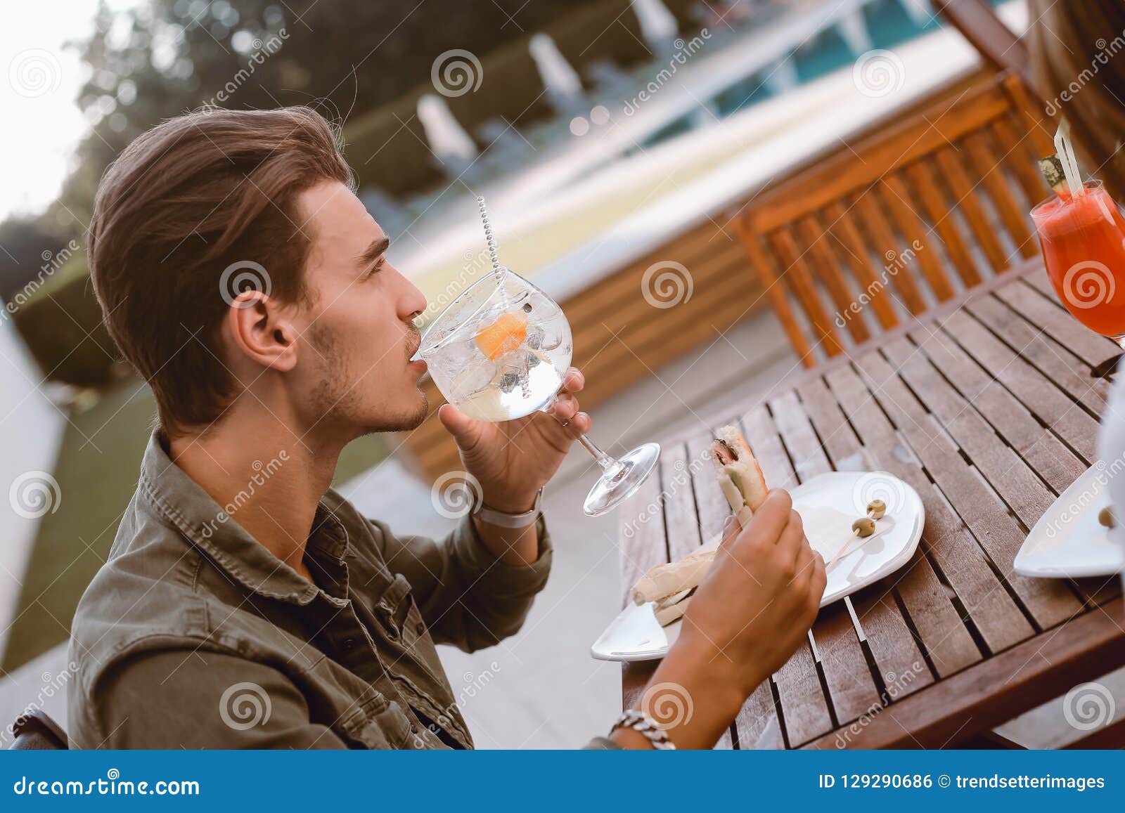 Man Drinking Cocktail and Lunching Stock Photo - Image of travel, food ...