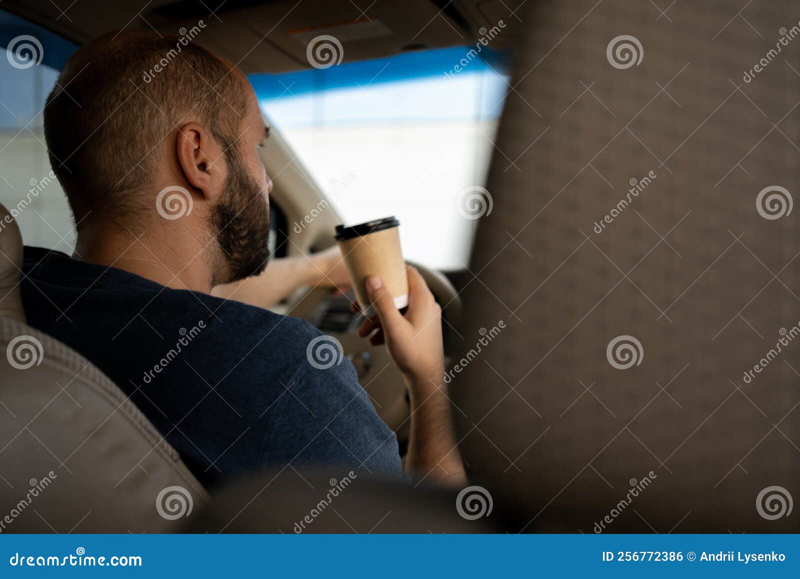 Man Drinking Coffee while Driving the Car. Transportation and Vehicle ...