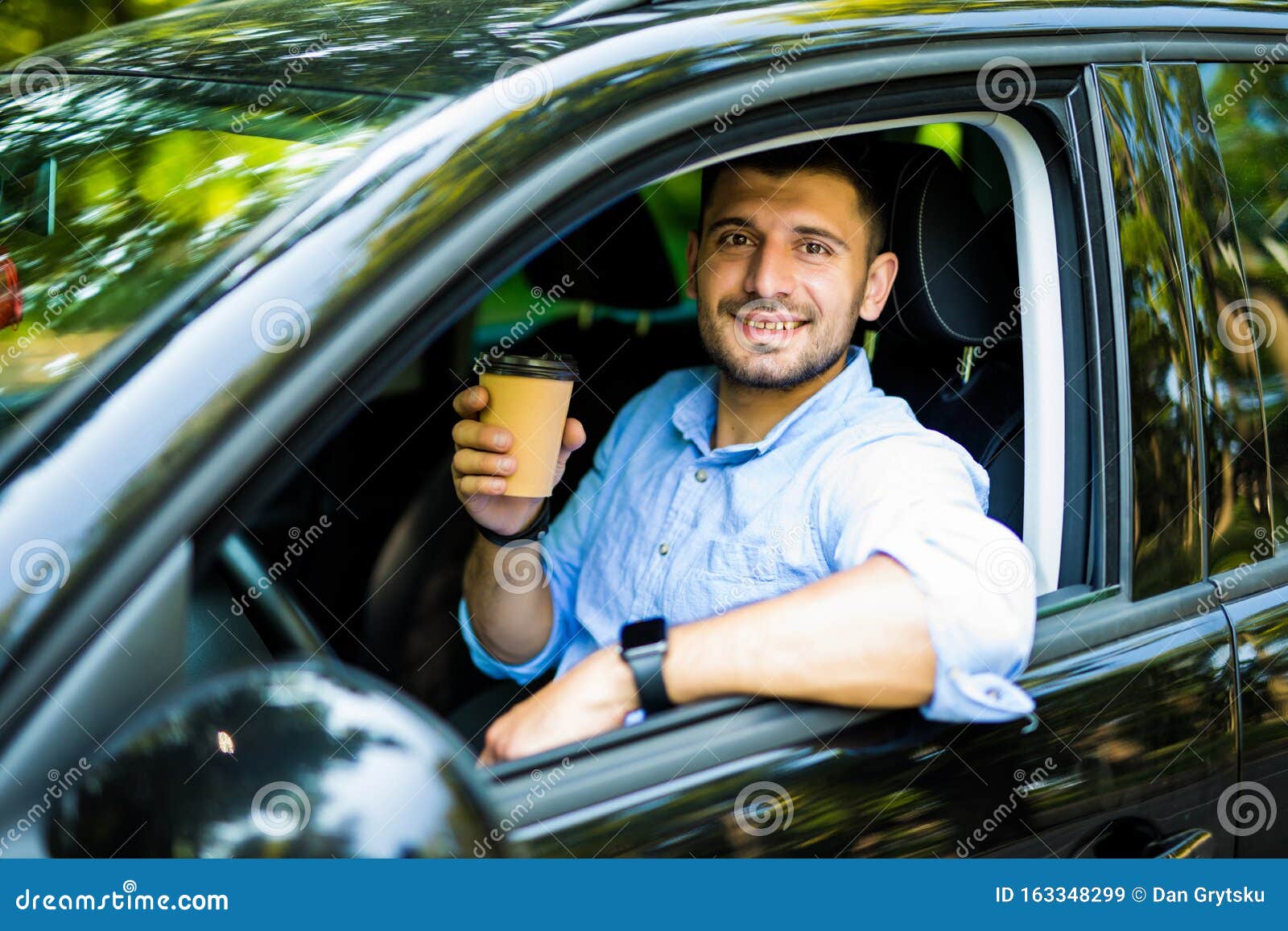 Young Man Drinking Coffee while Driving the Car Stock Image - Image of ...
