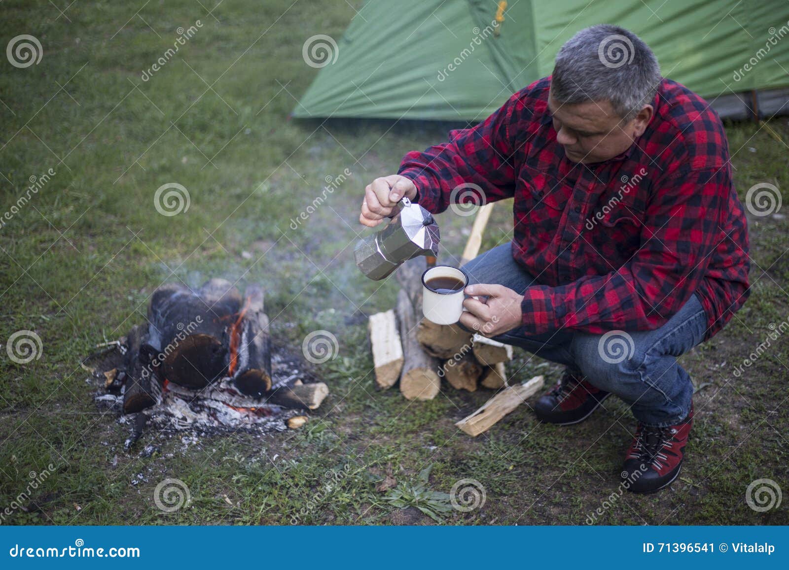 Man Drinking Coffee by the Fire. Stock Image - Image of cooking ...