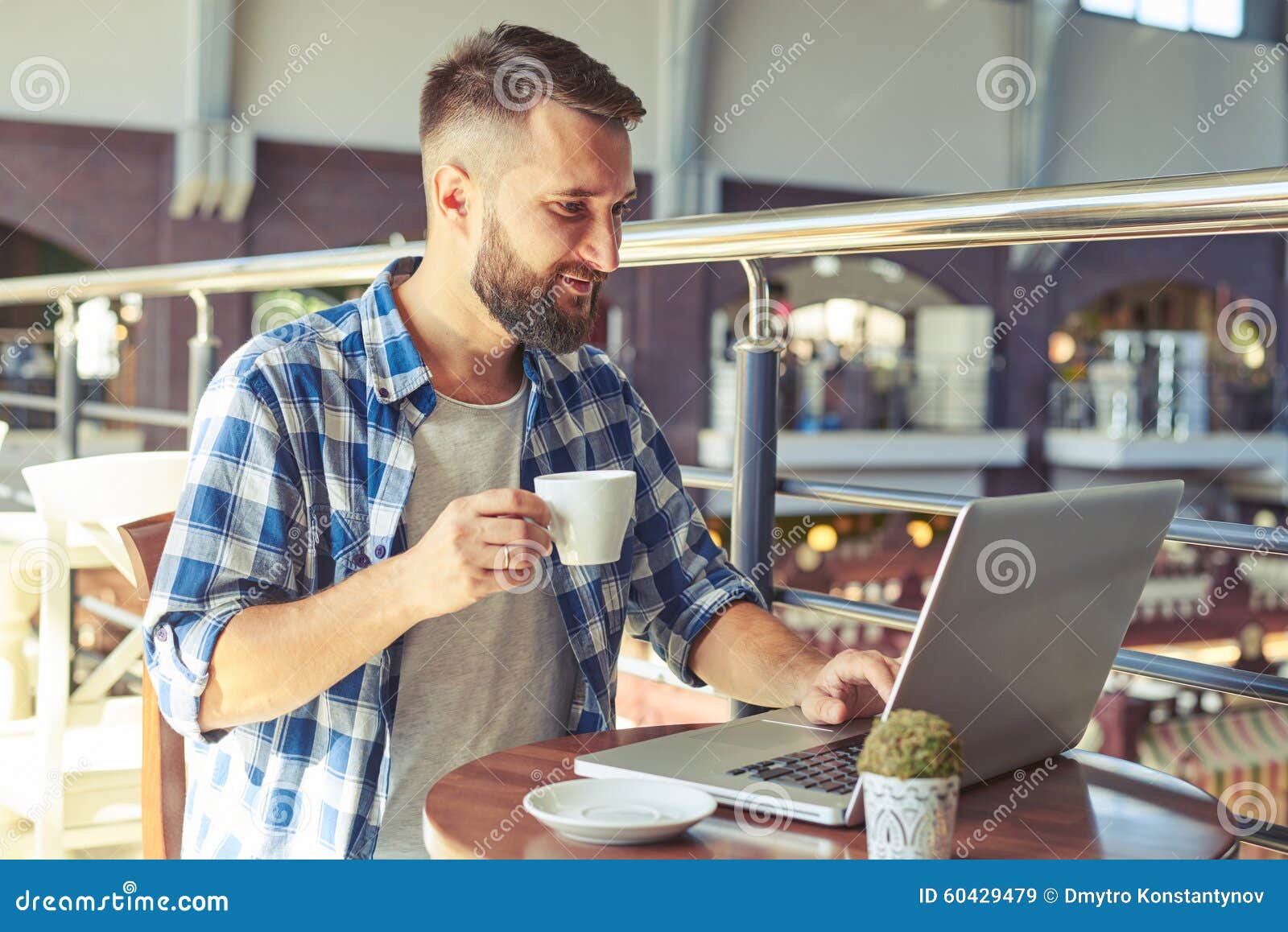 Man Drinking Coffee and Using Laptop in Cafe Stock Image - Image of ...